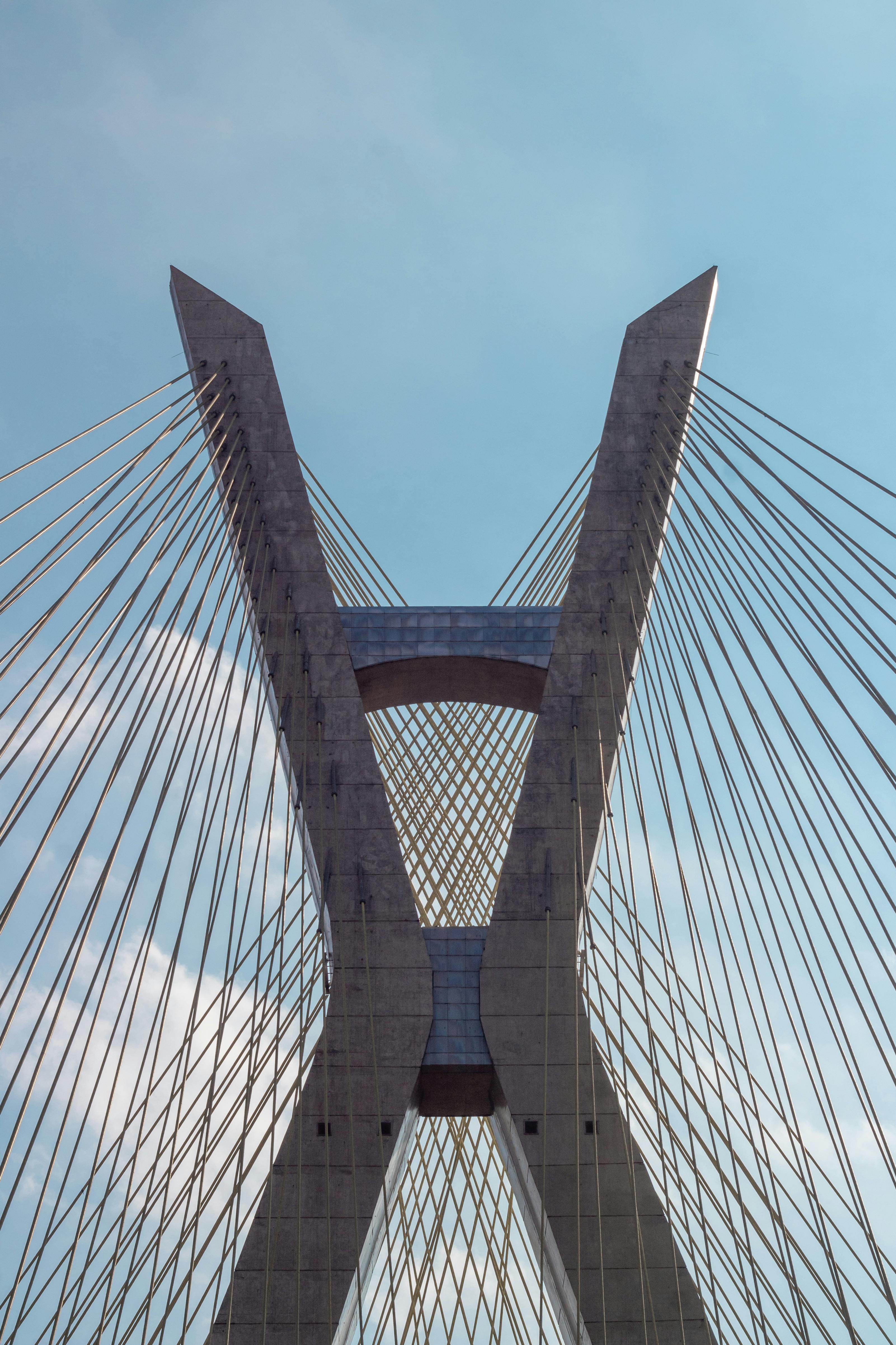 Symmetrical Bridge with blue sky · Free Stock Photo