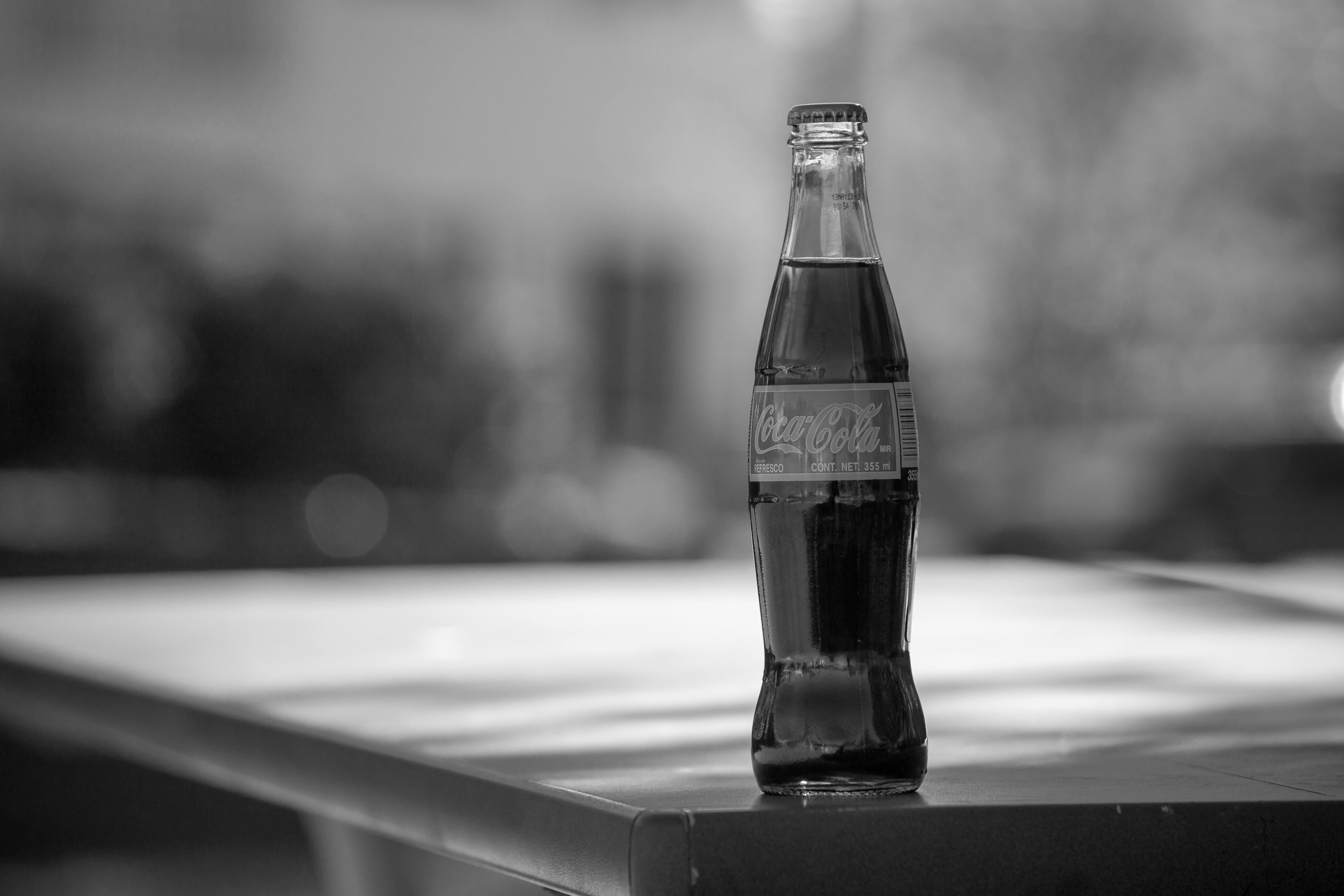 Three White and Brass Coca-cola Bottles · Free Stock Photo