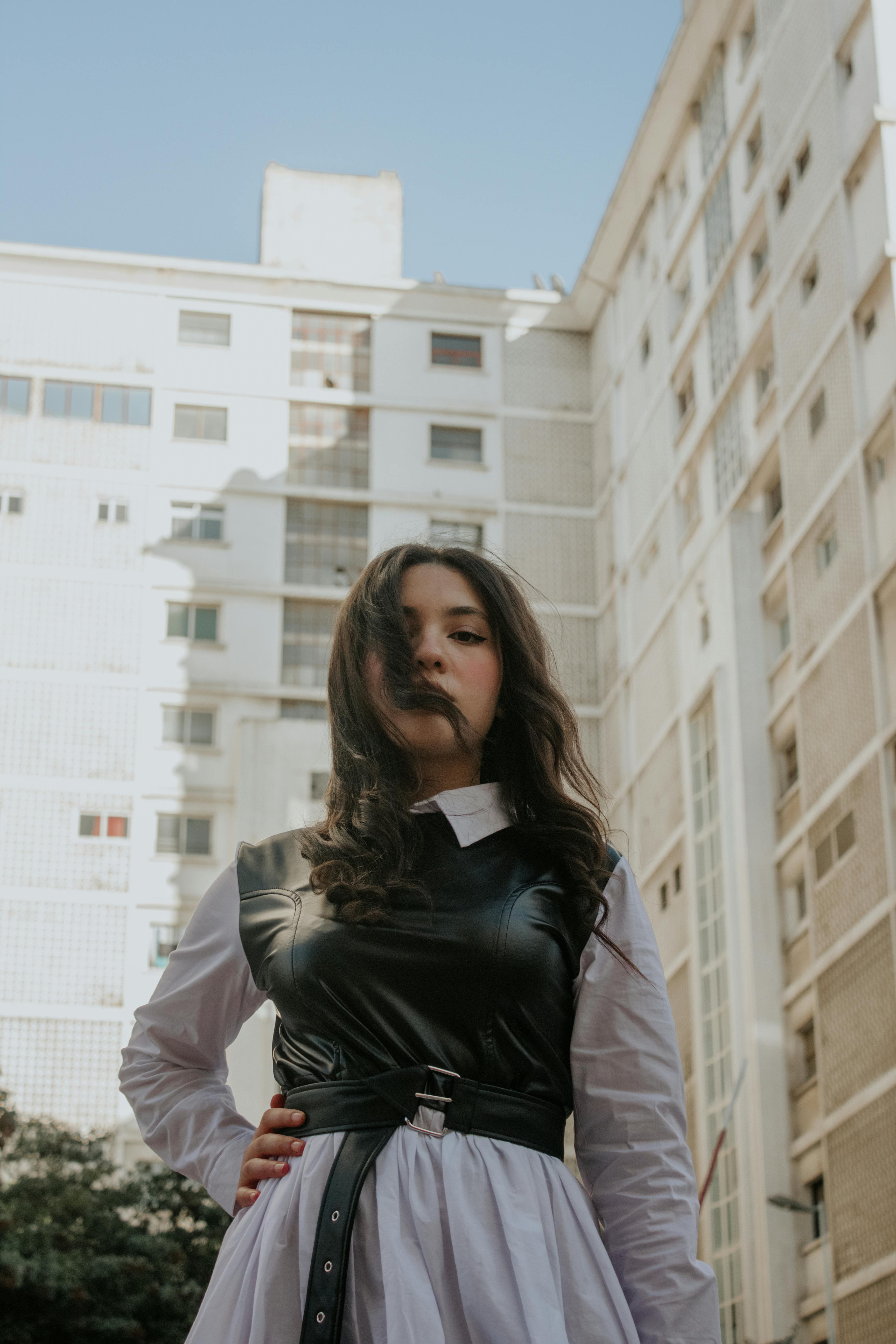 Woman Standing in White Modest Skirt and Holding Hand on Hip · Free ...