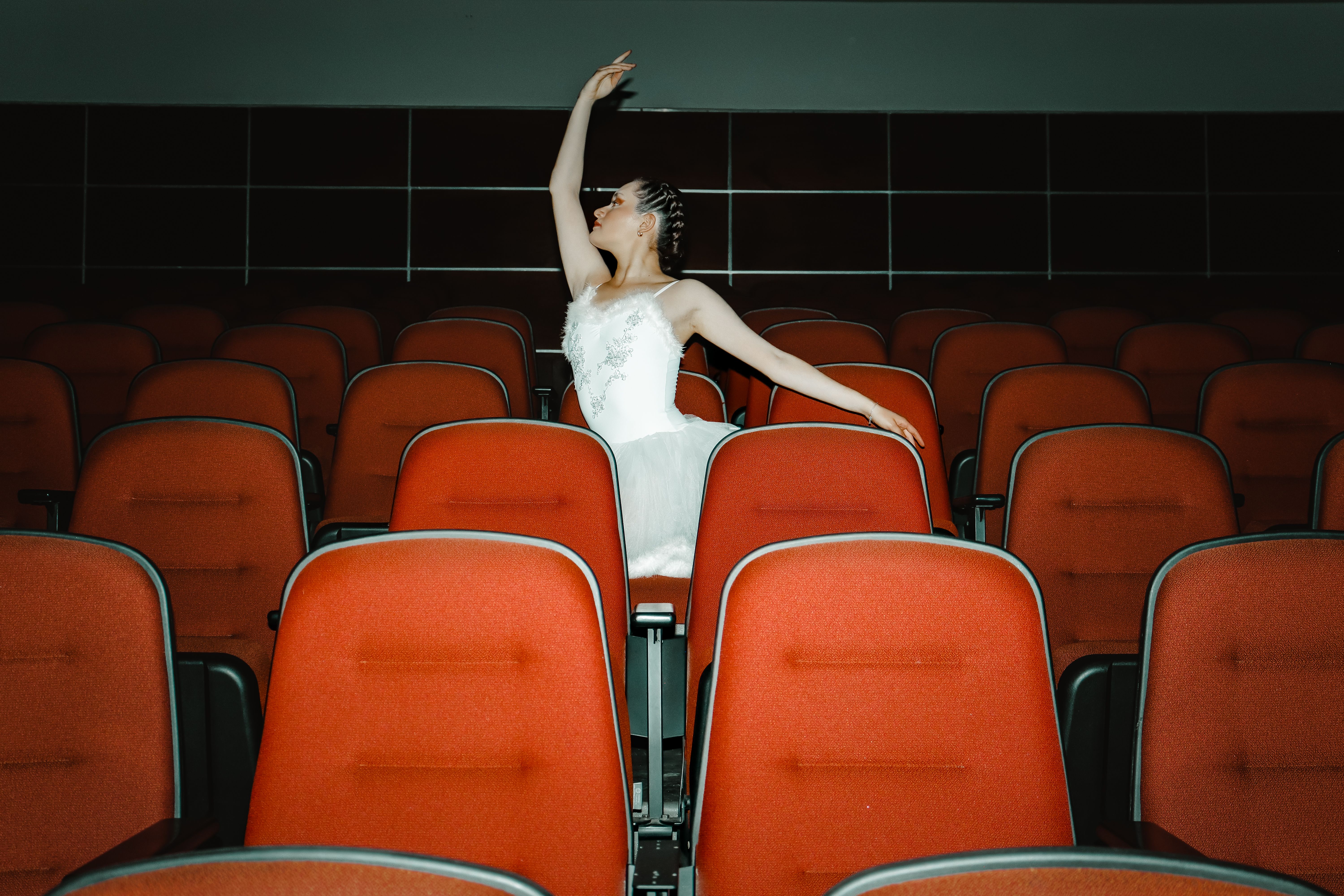 Ballerina among Seats · Free Stock Photo