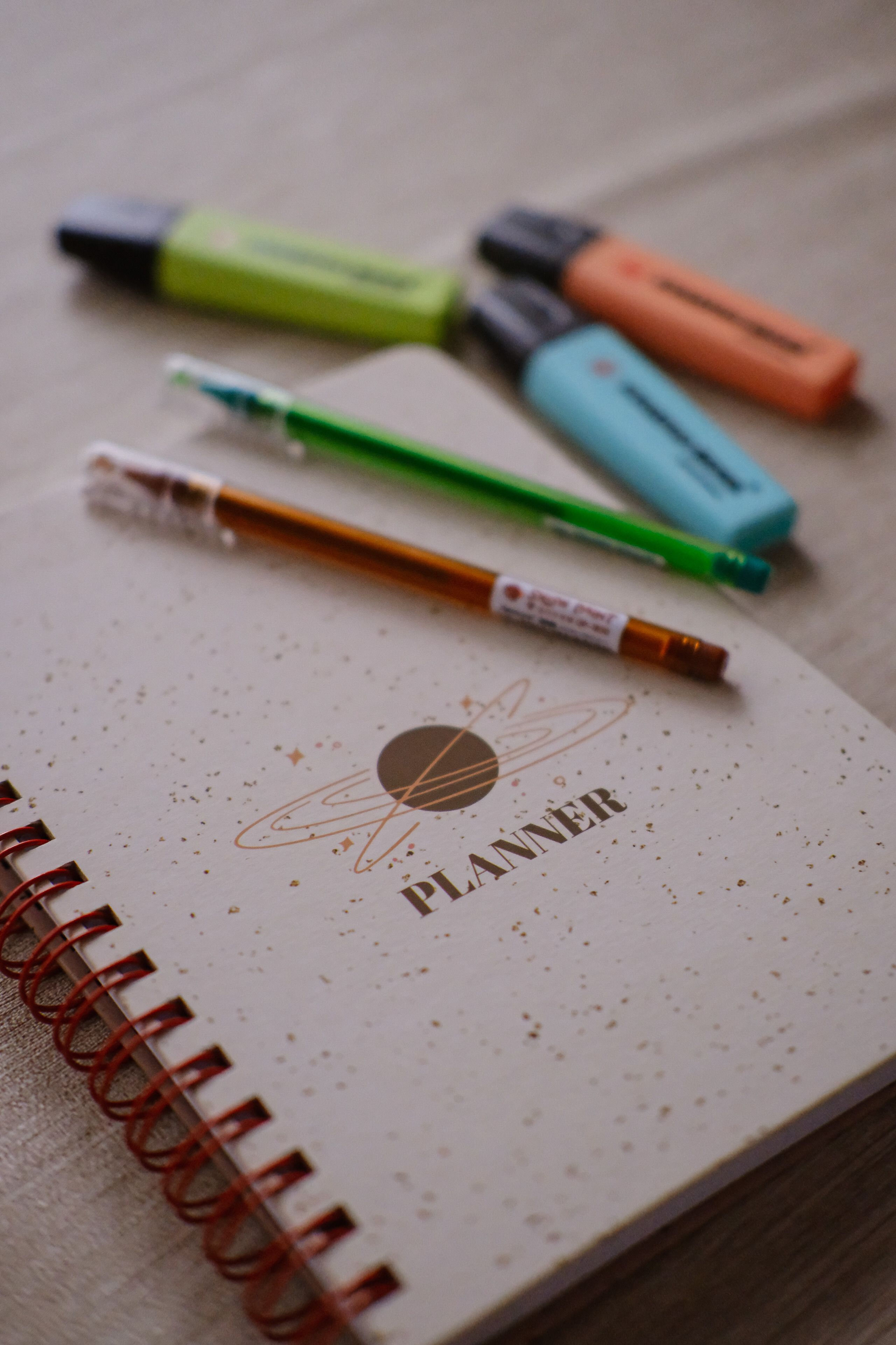 Black Ball-point Pen With Brown Spiral Notebook · Free Stock Photo