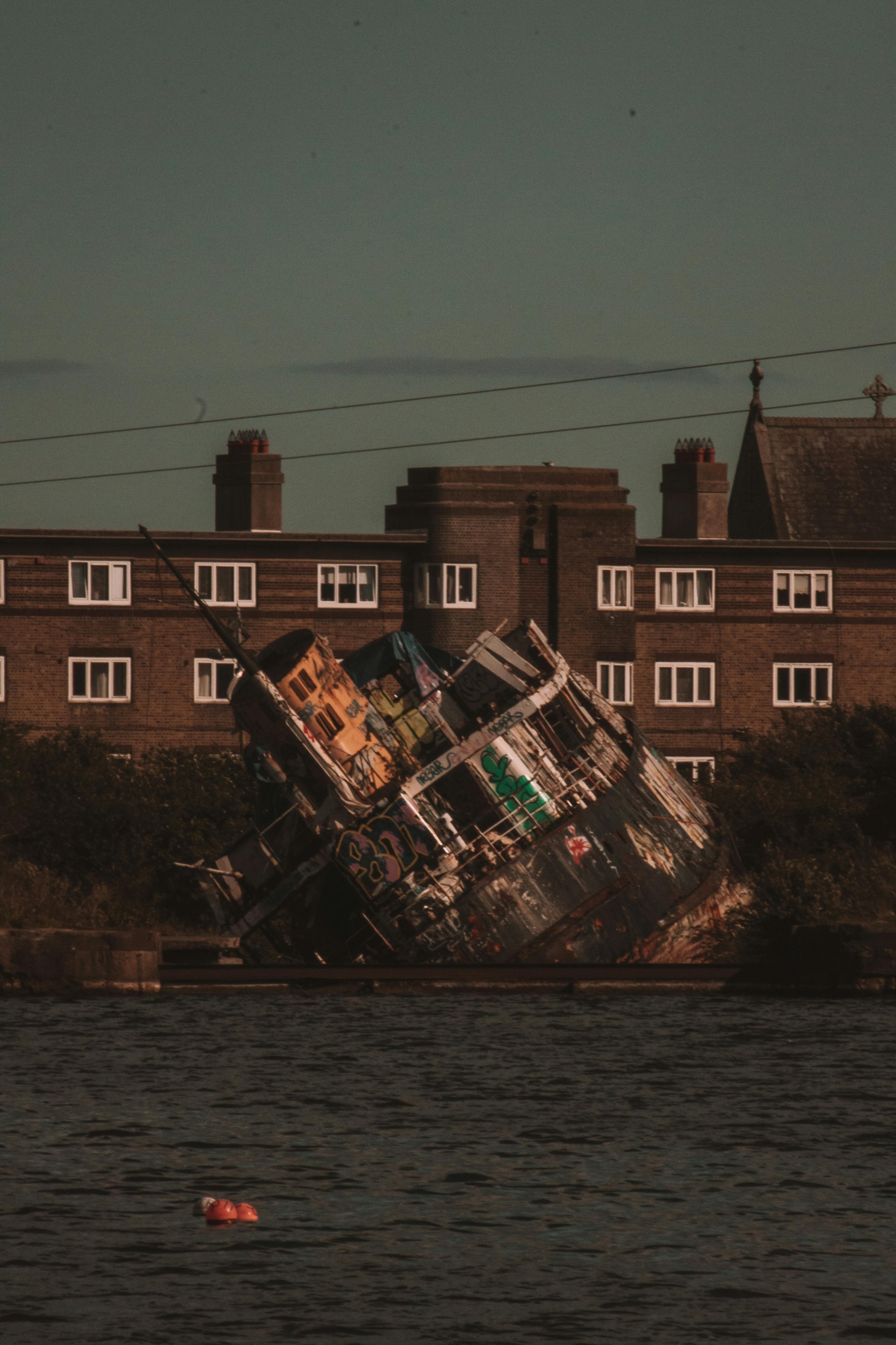 Sinking Building In Water Photos, Download The BEST Free Sinking ...