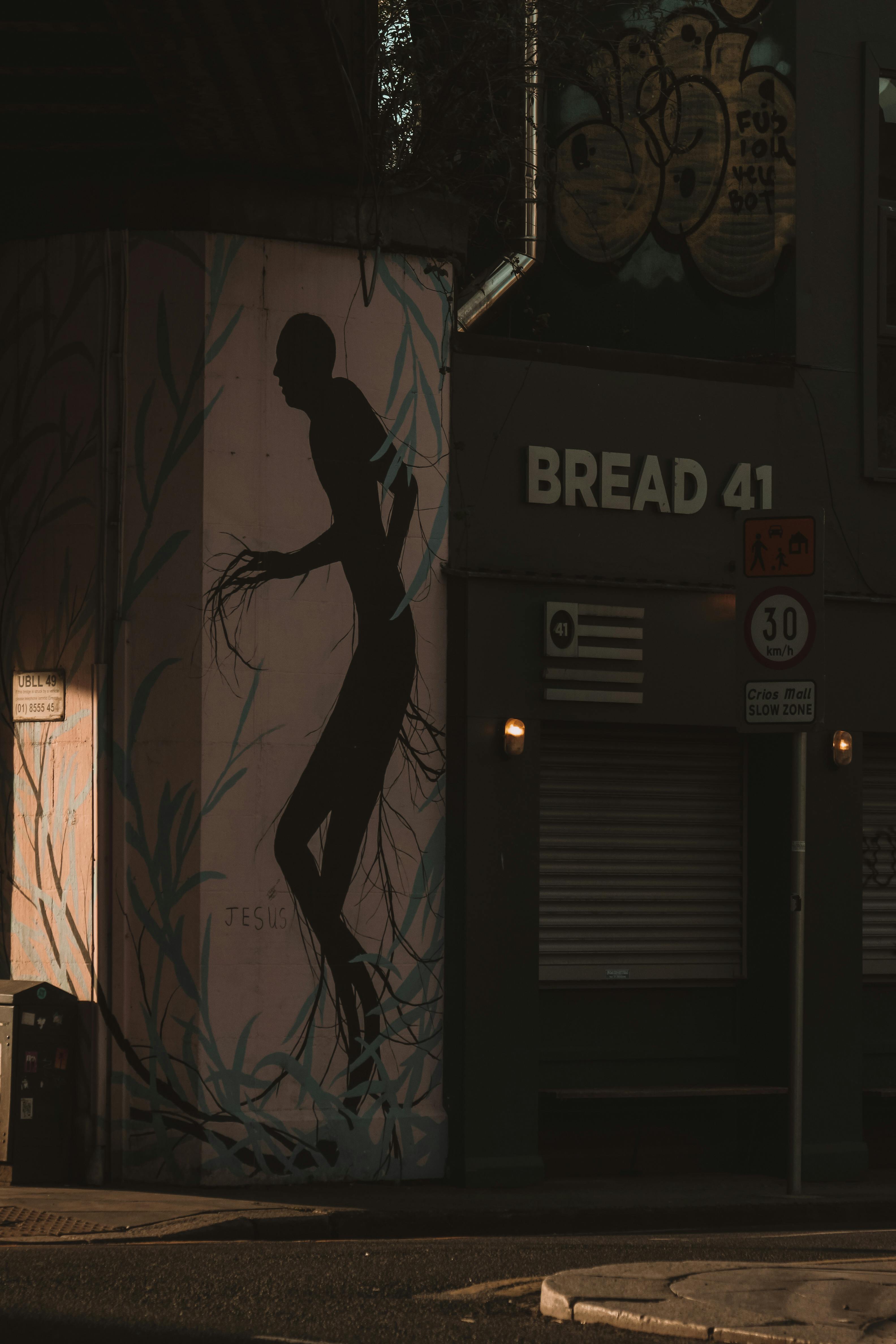 A Dark Graffiti on a Wall · Free Stock Photo