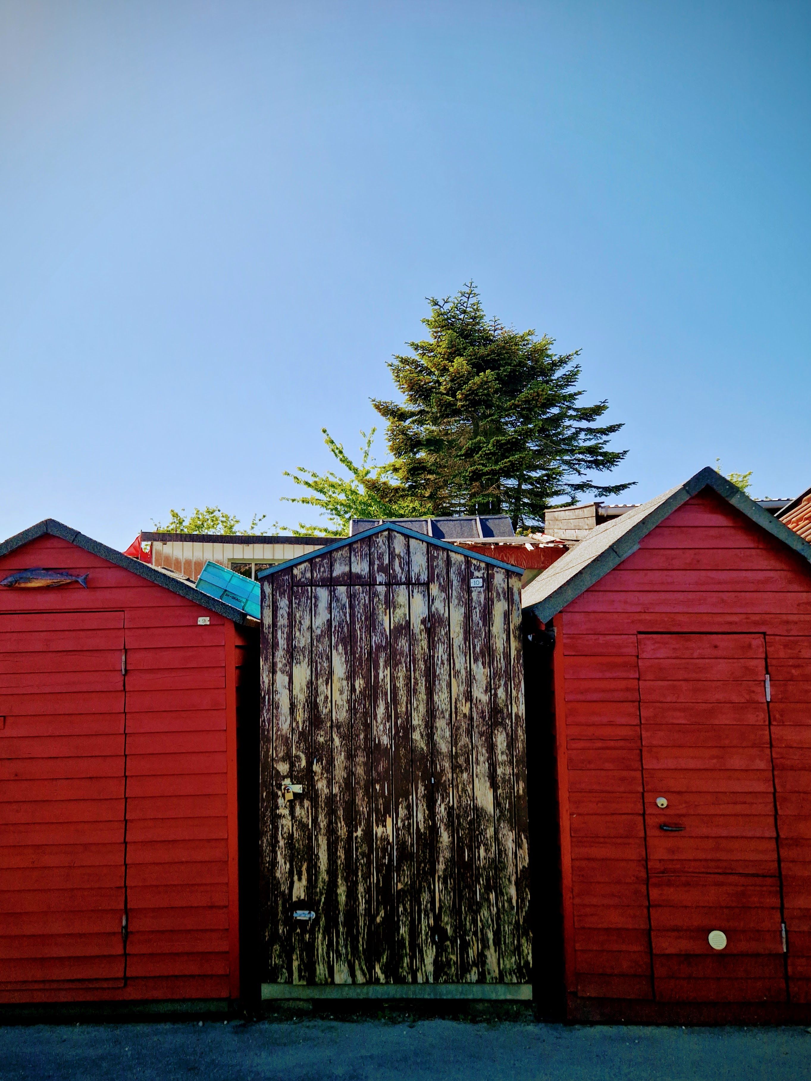 Wooden Sheds under Clear Sky · Free Stock Photo