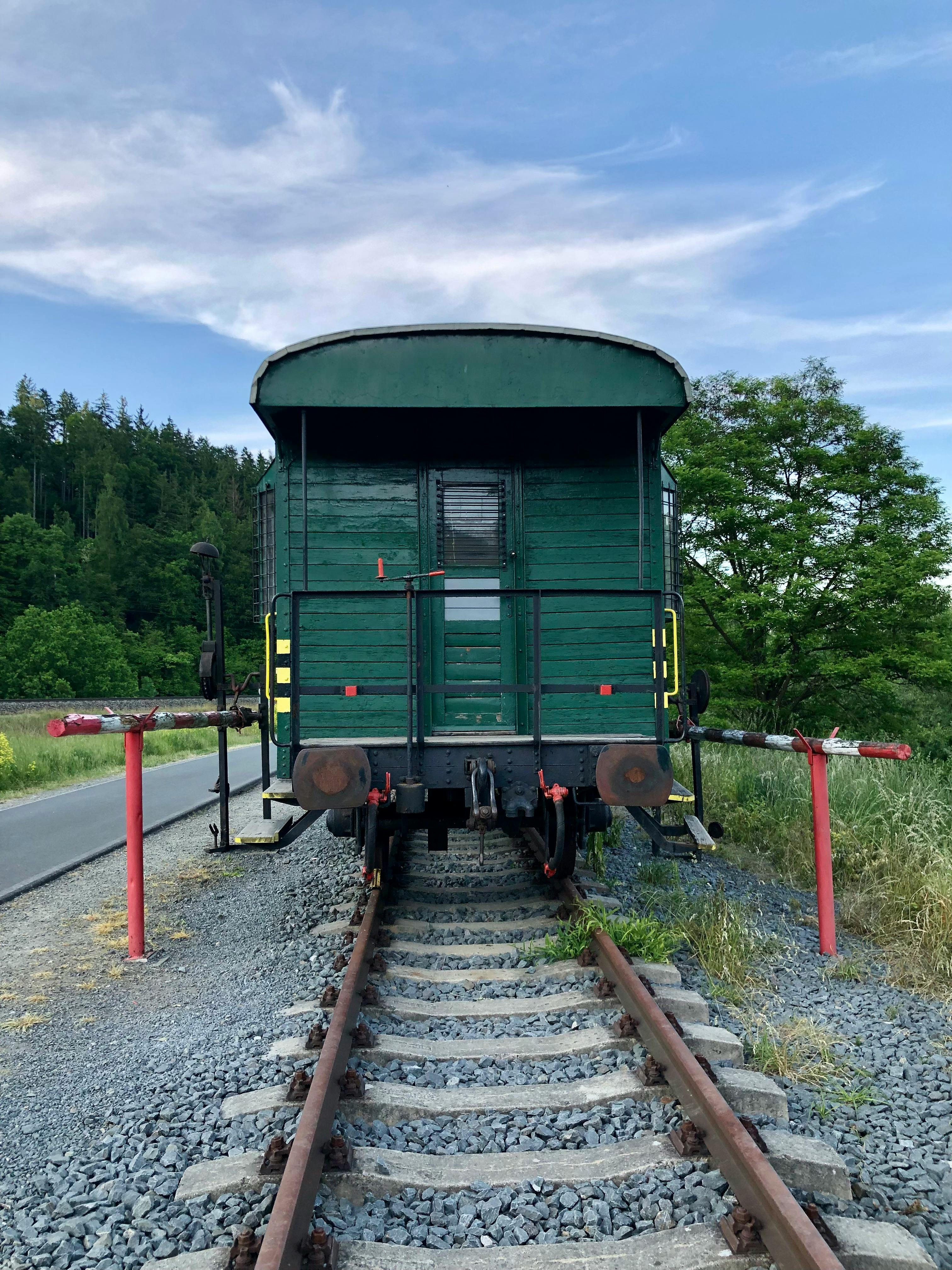 Green Wooden Train Carriage on Track · Free Stock Photo