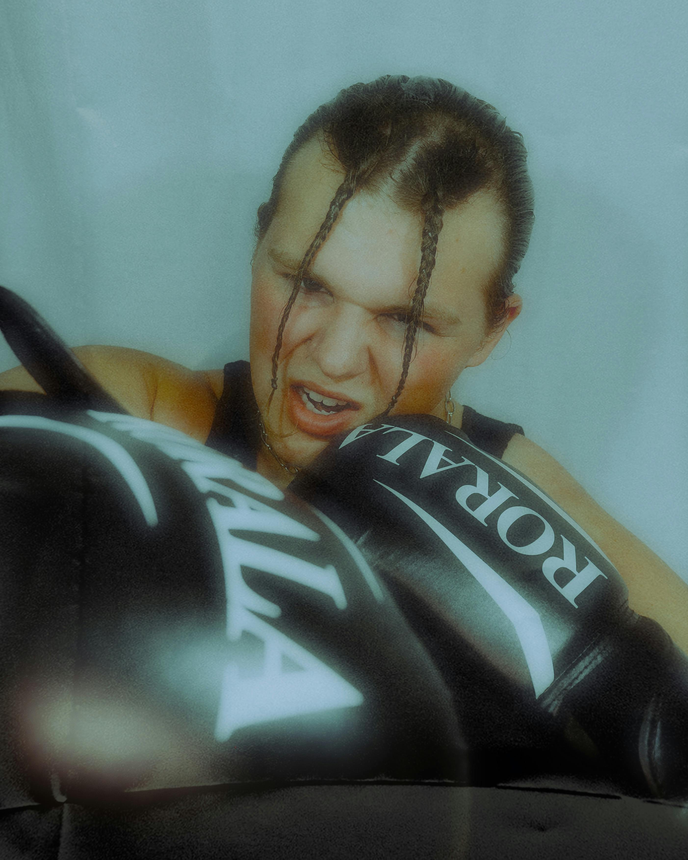 Woman Wearing Black Sports Bra and Short on Boxing Ring · Free Stock Photo