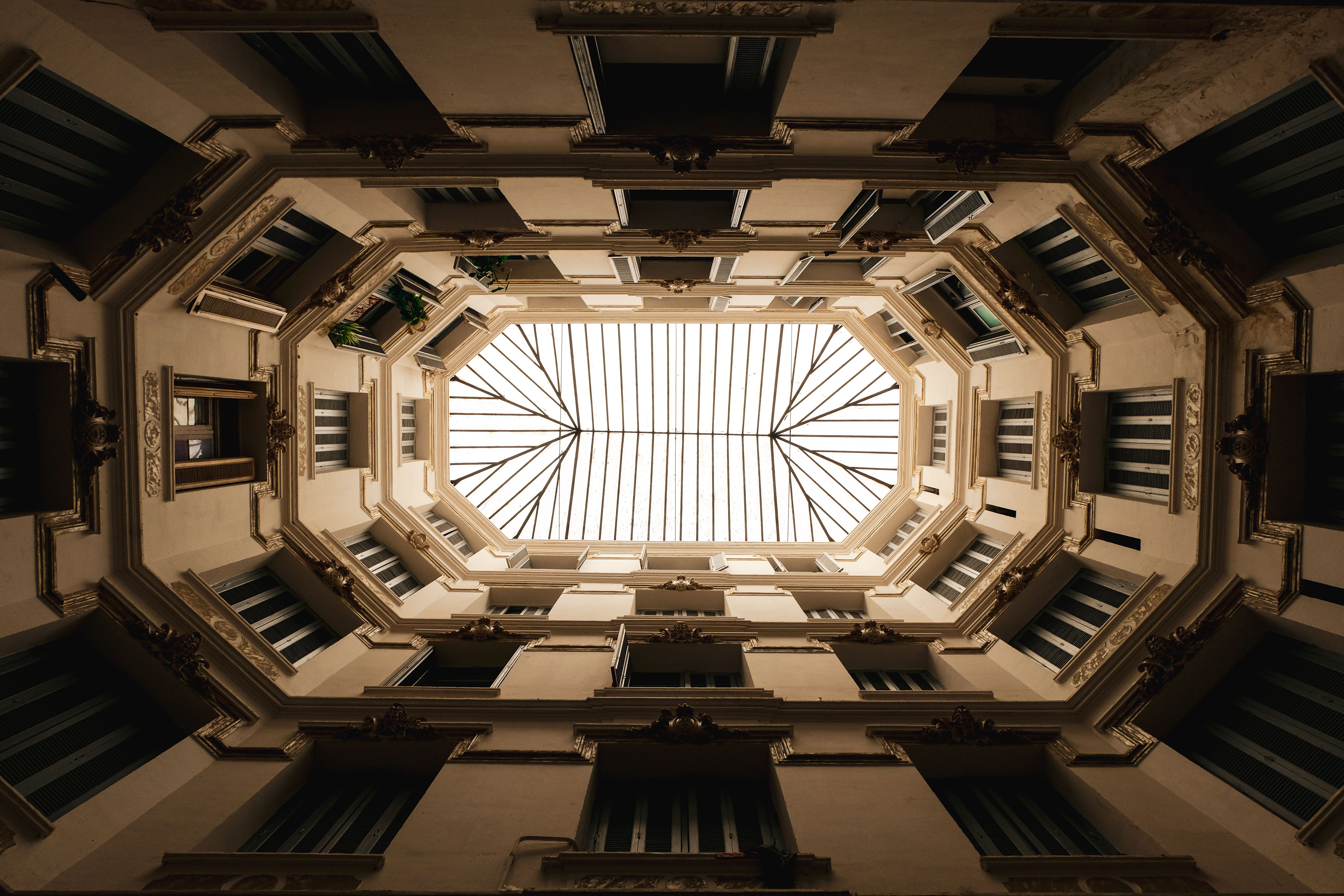 Arched Ceiling and Stained Glass Windows in a Cathedral · Free Stock Photo