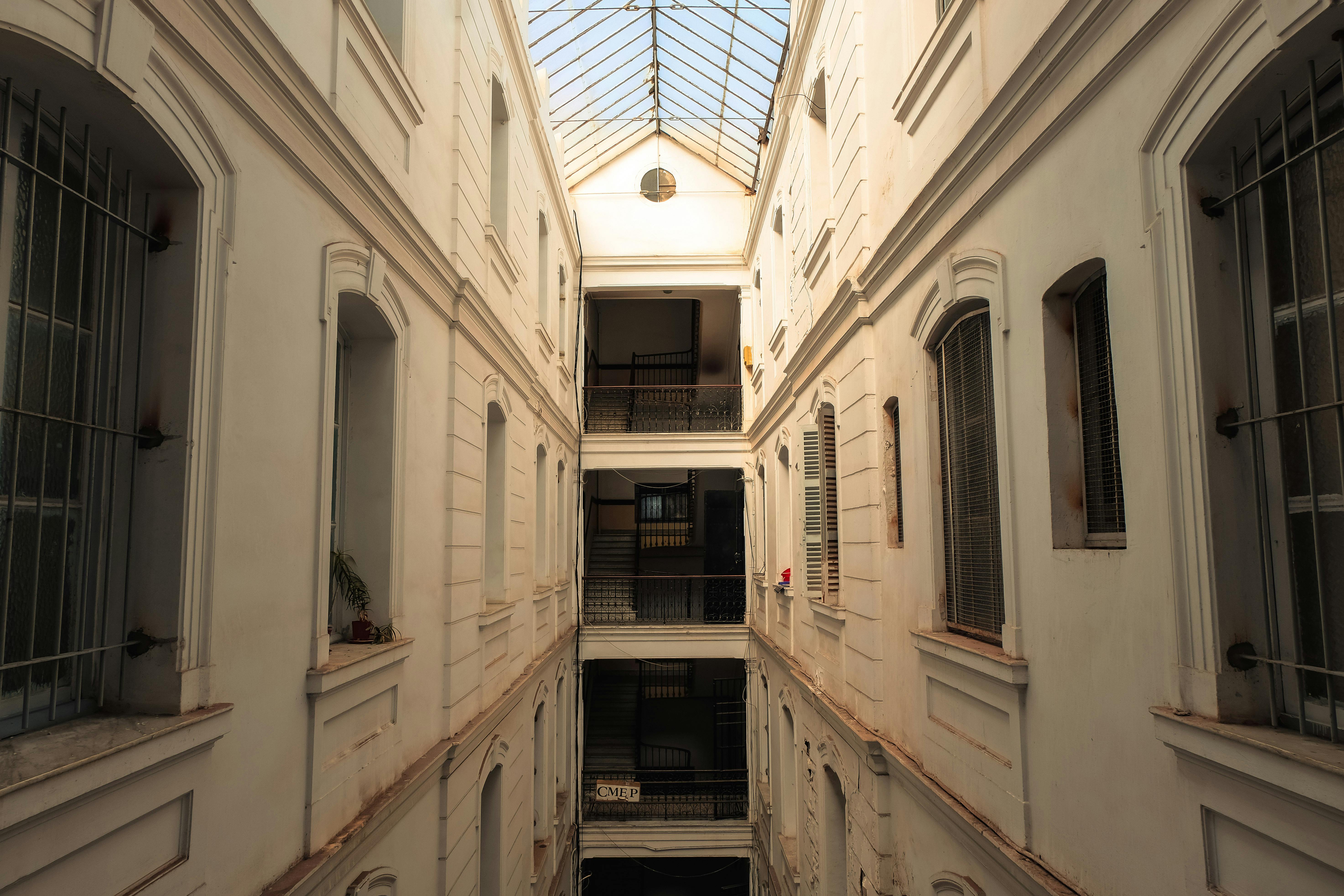 Beige Concrete Building · Free Stock Photo