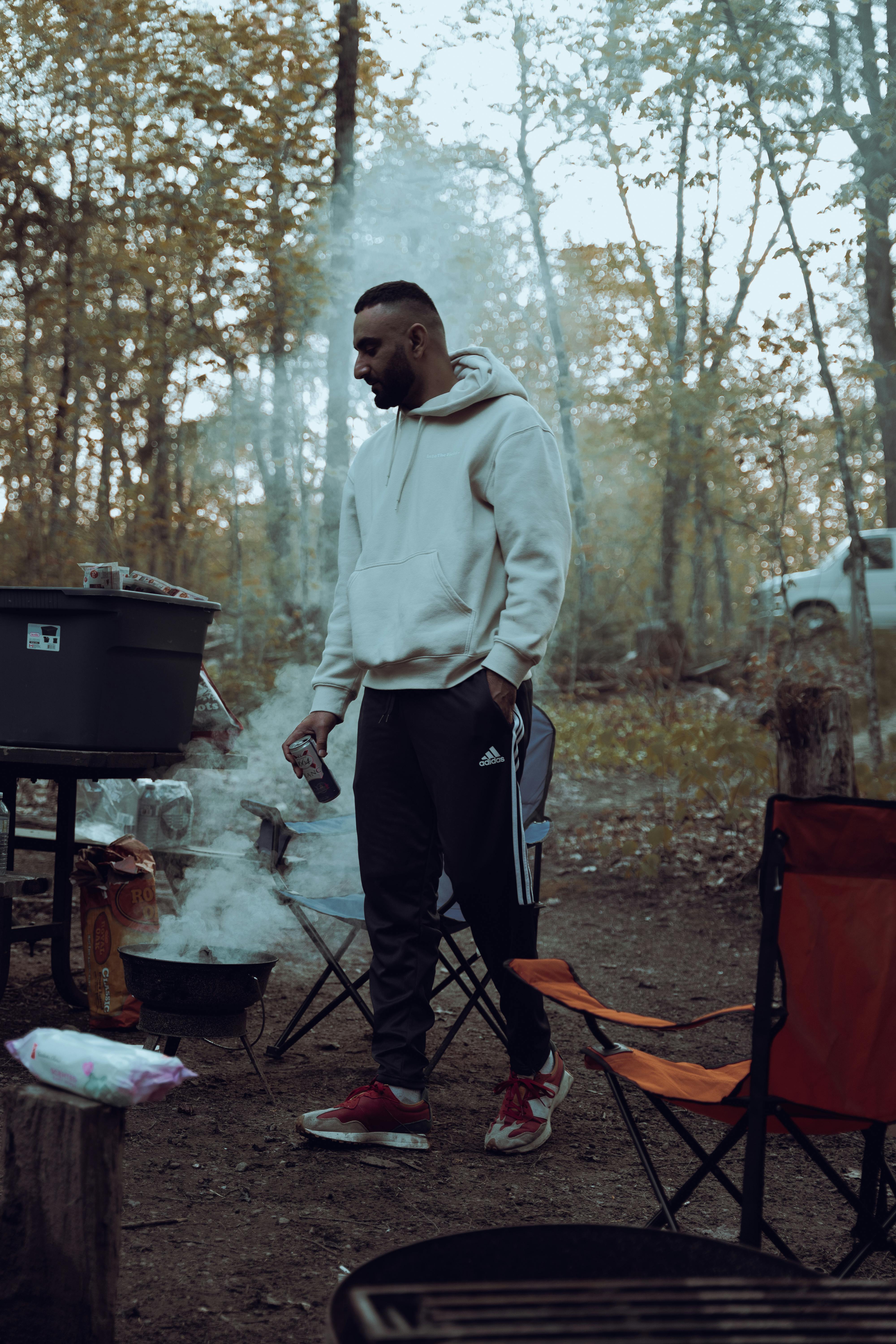 A People Drinking Beer in the Forest · Free Stock Photo