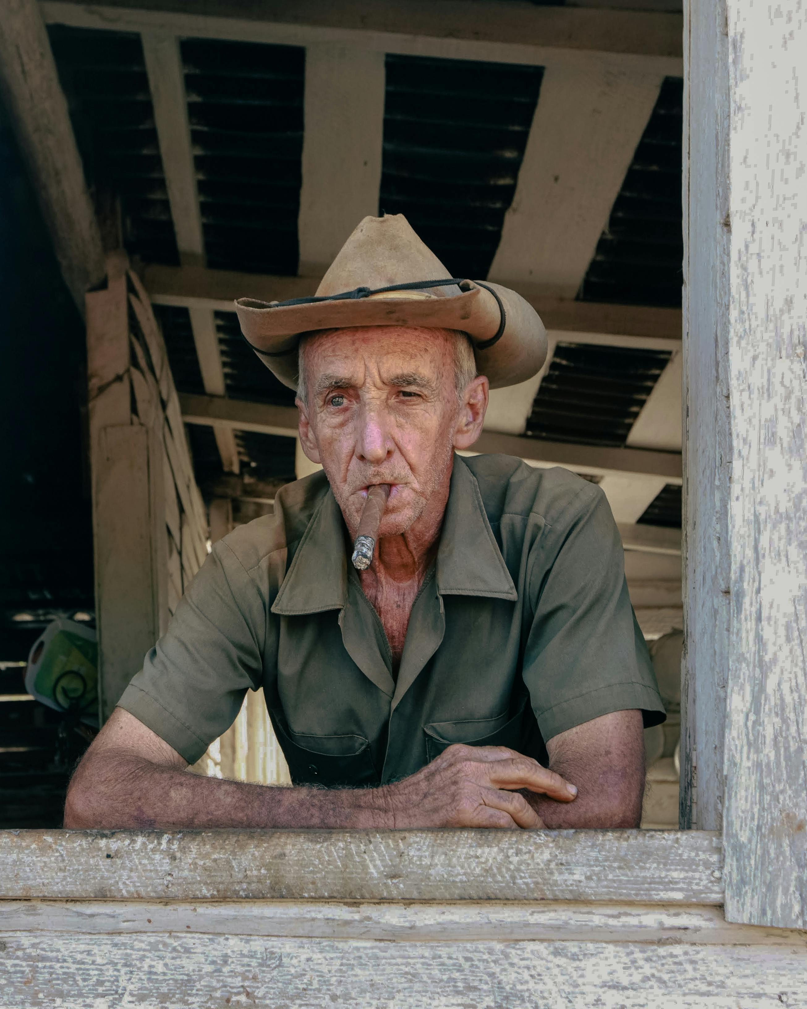 Elderly Man Smoking a Cigar · Free Stock Photo