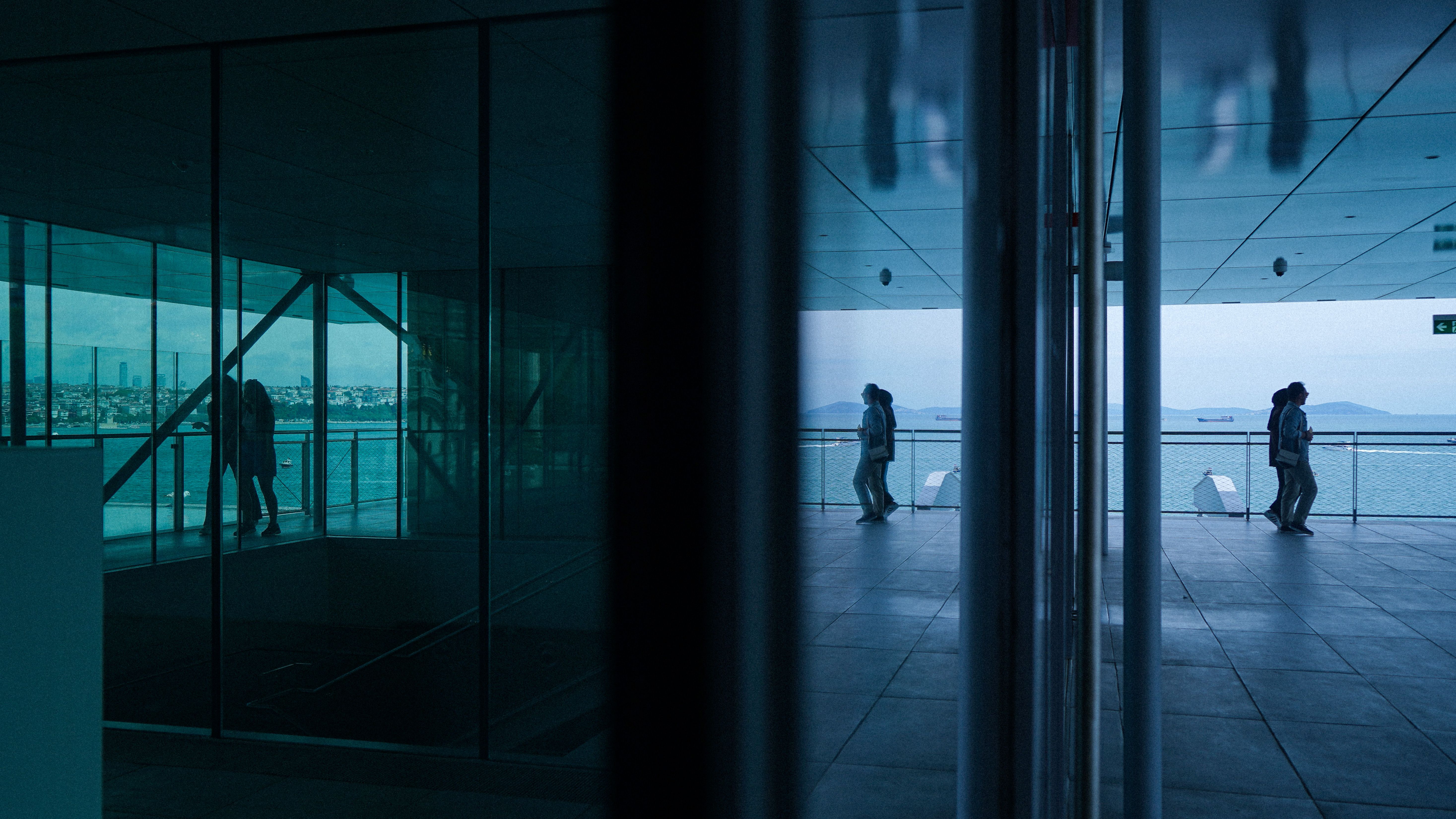 Reflection of People in Windows on Coast of Istanbul · Free Stock Photo