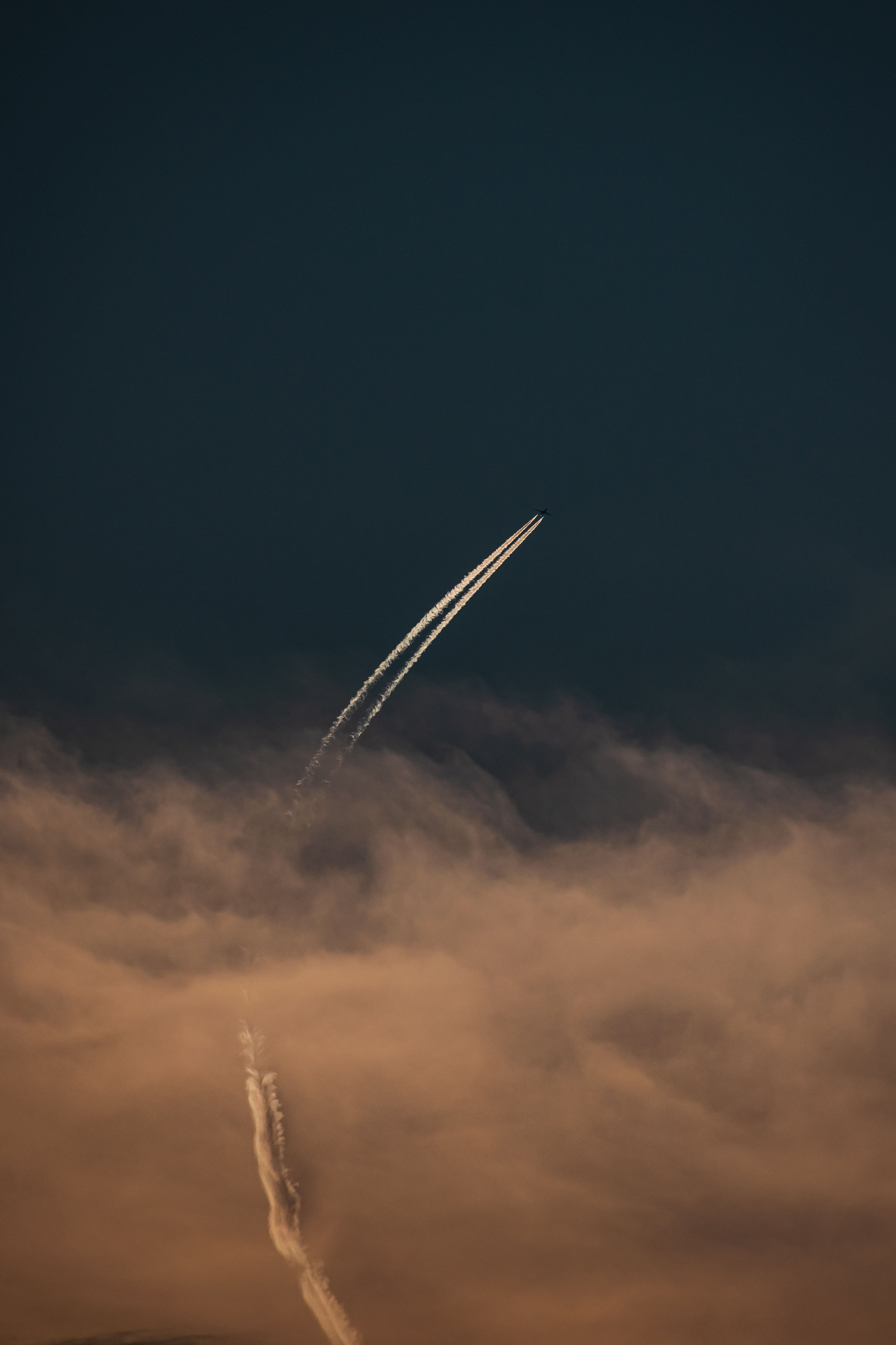 Contrail over Cloud on Night Sky · Free Stock Photo