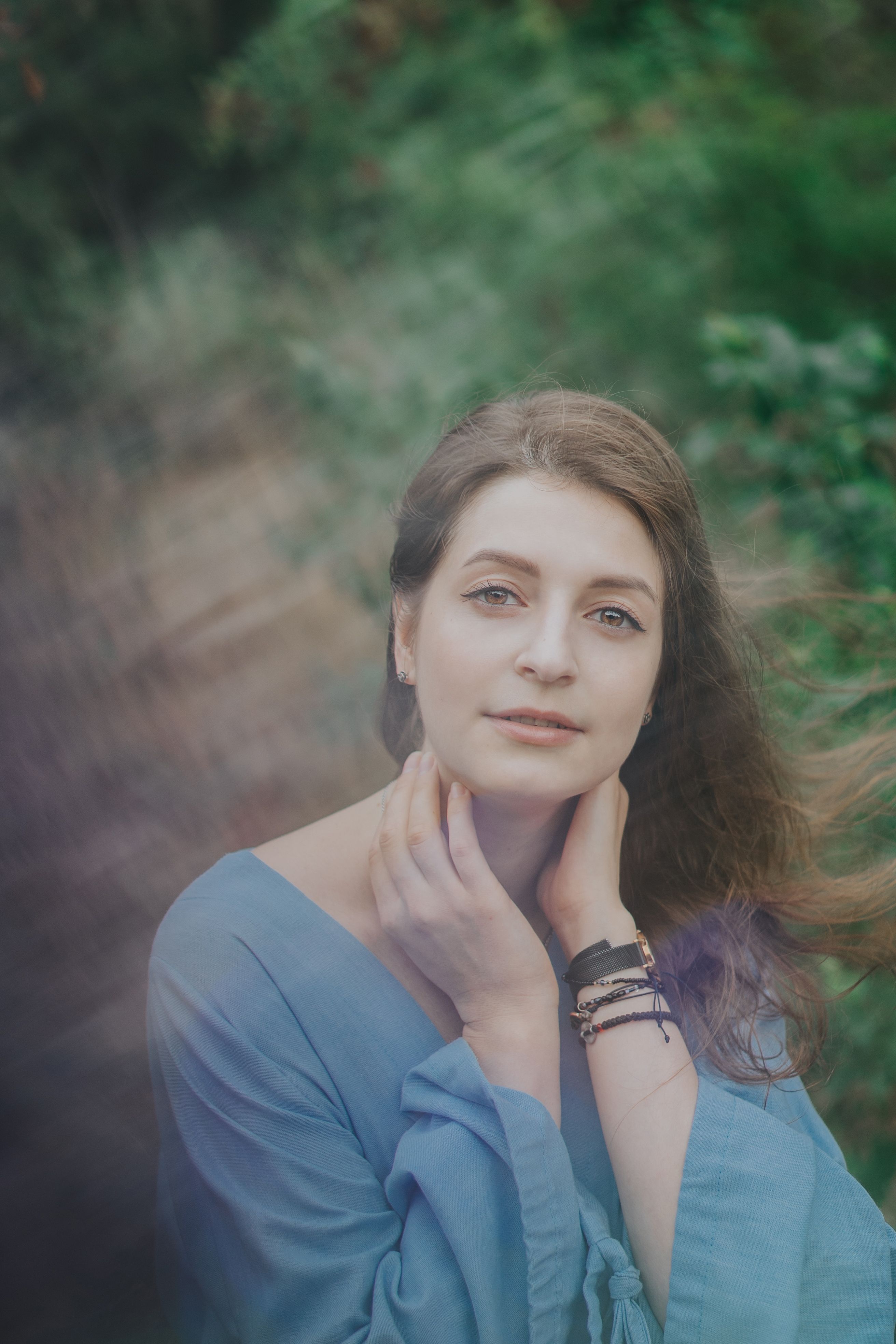 Portrait of Woman with Hands on Neck · Free Stock Photo
