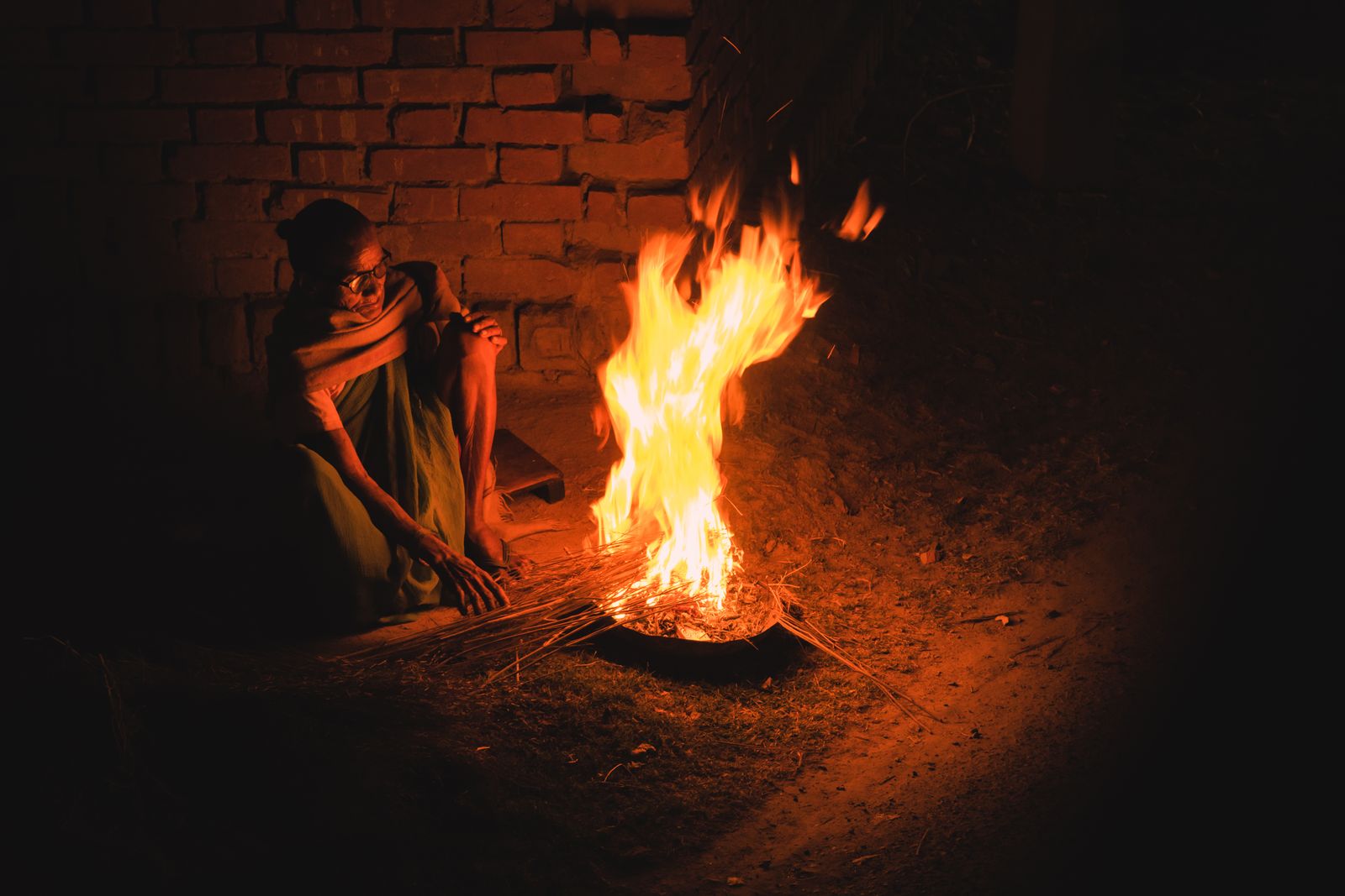 Sitting By Fireplace Photos, Download The BEST Free Sitting By ...