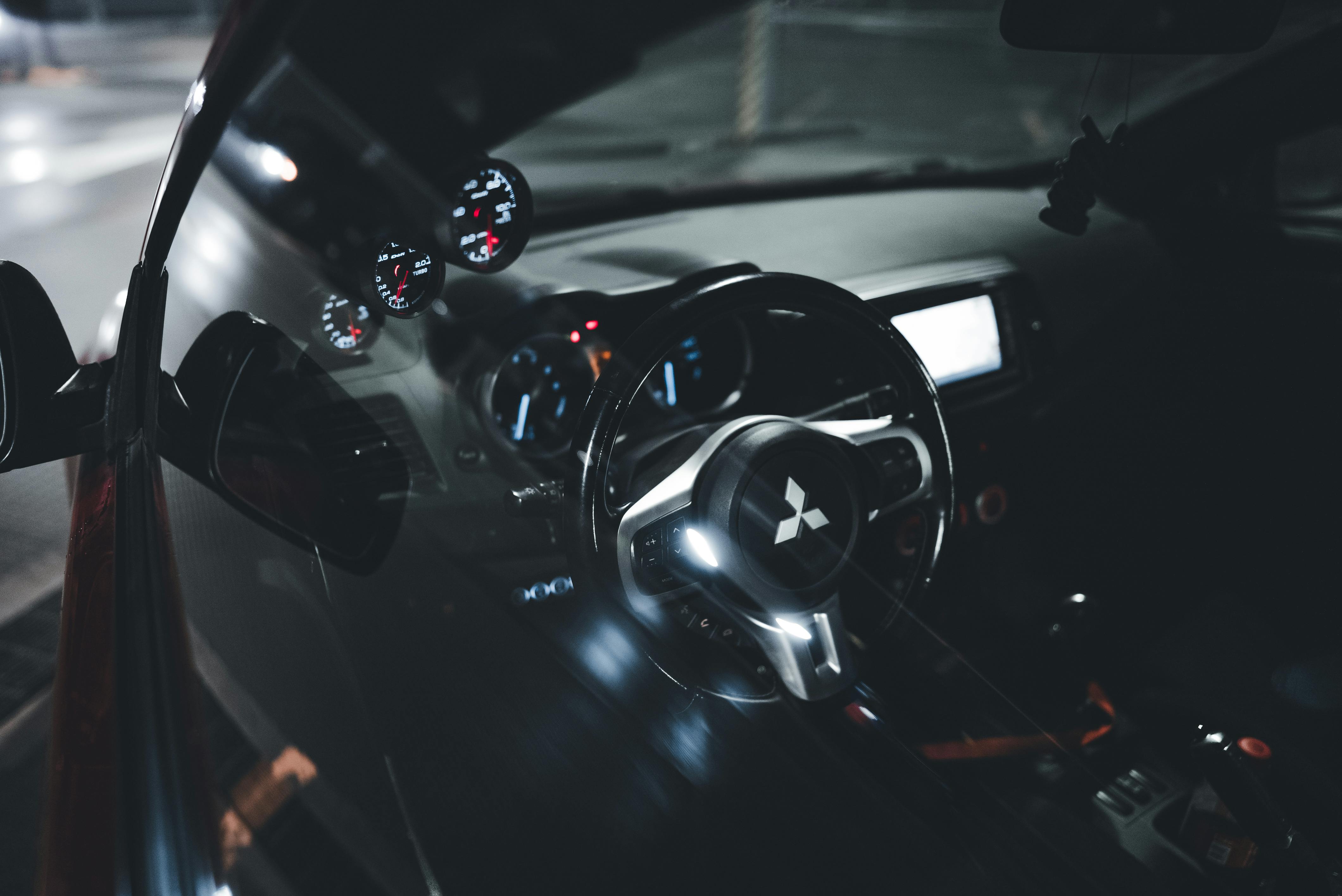 White Mitsubishi Lancer Evolution on the Race Track · Free Stock Photo