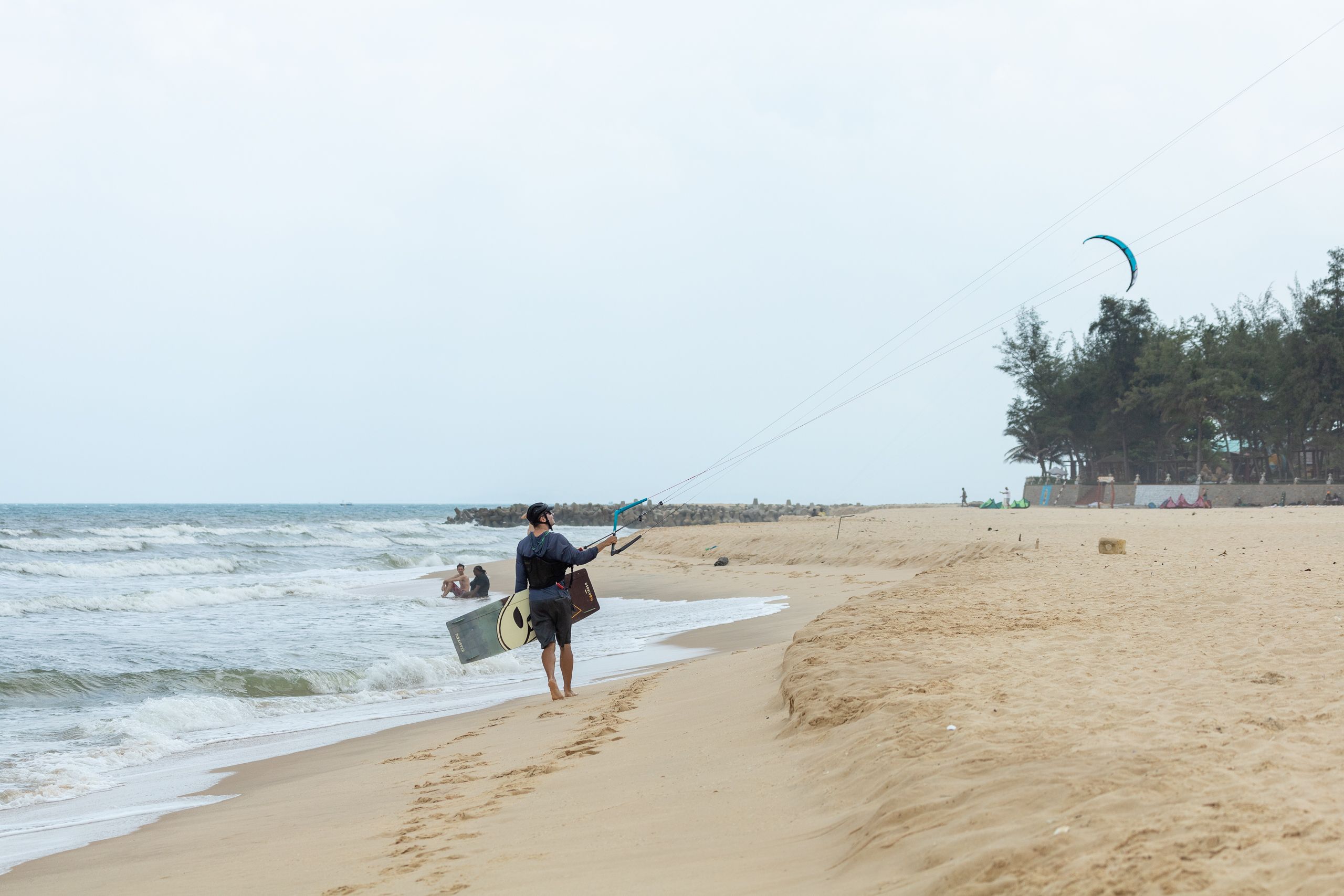 Photo of Woman Walking on Seashore · Free Stock Photo