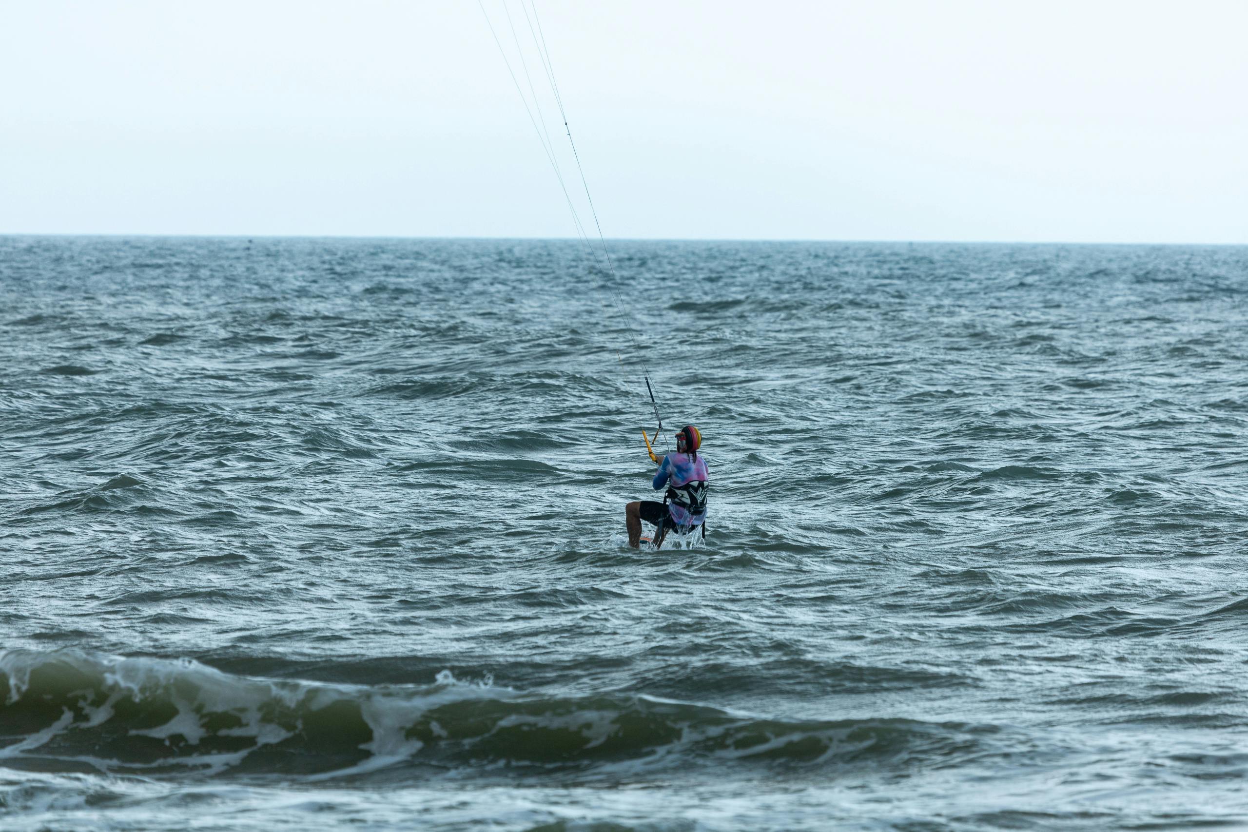 Man Holding to a Power Kite · Free Stock Photo
