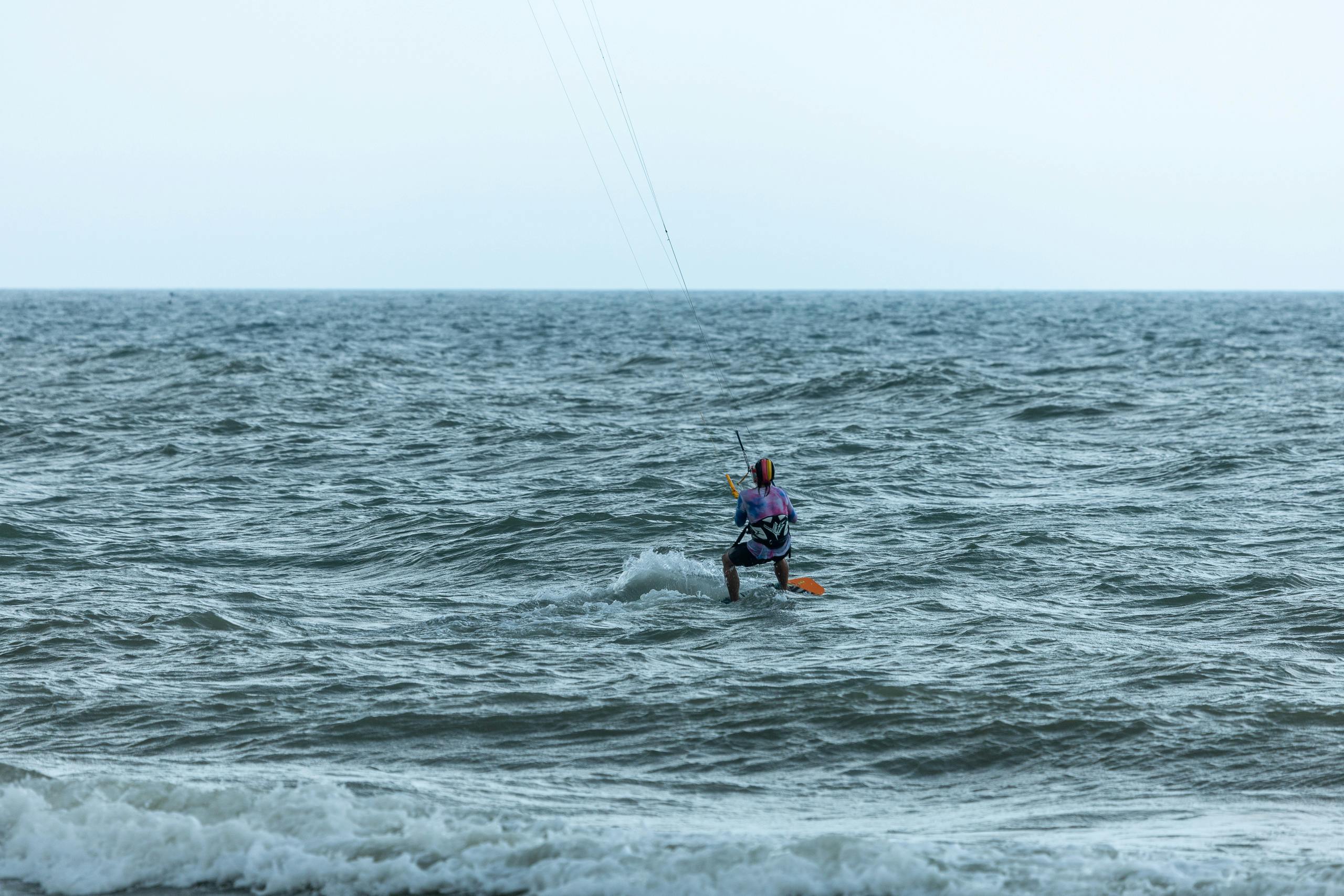 Man Holding to a Power Kite · Free Stock Photo