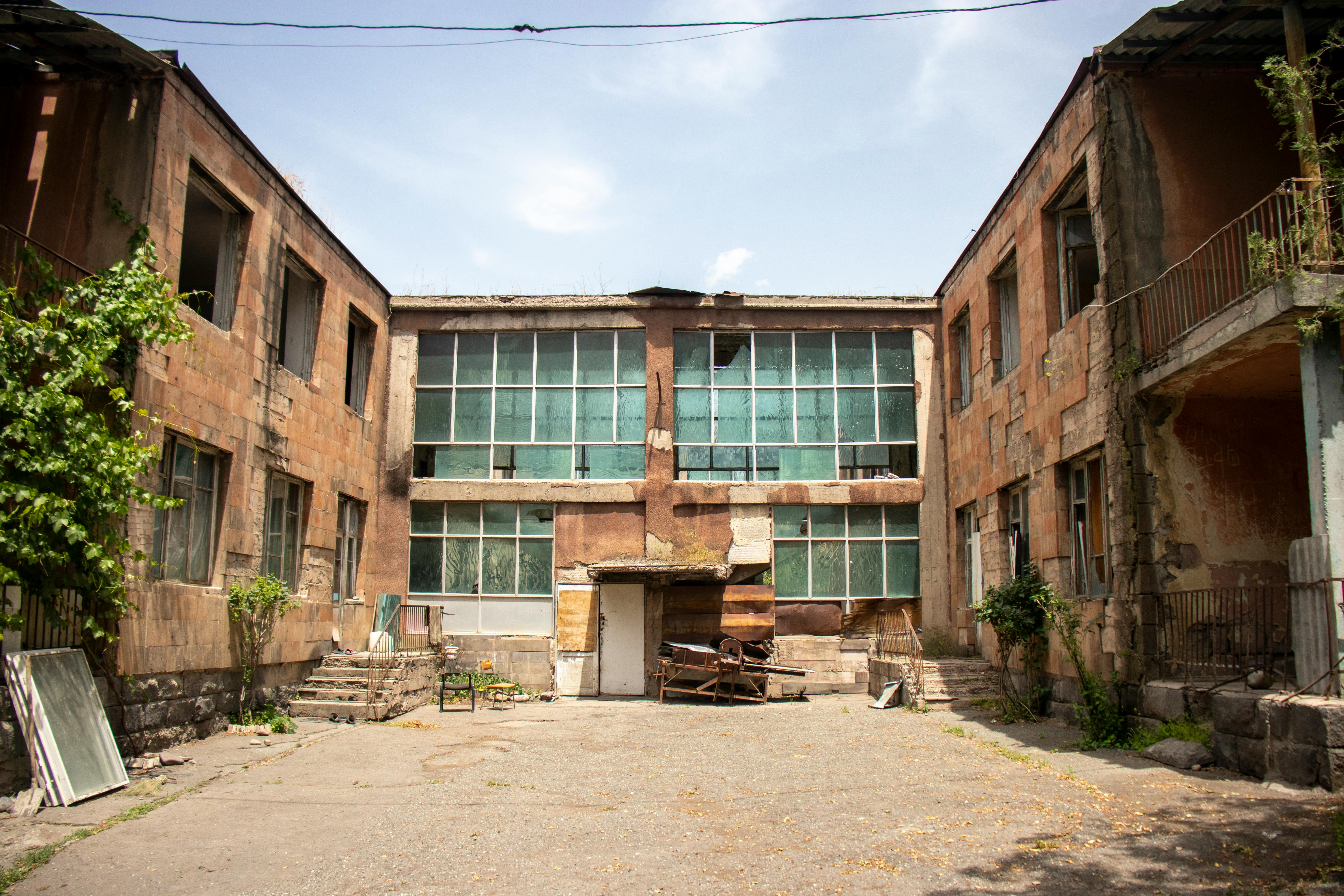 Facade of an Abandoned Building · Free Stock Photo