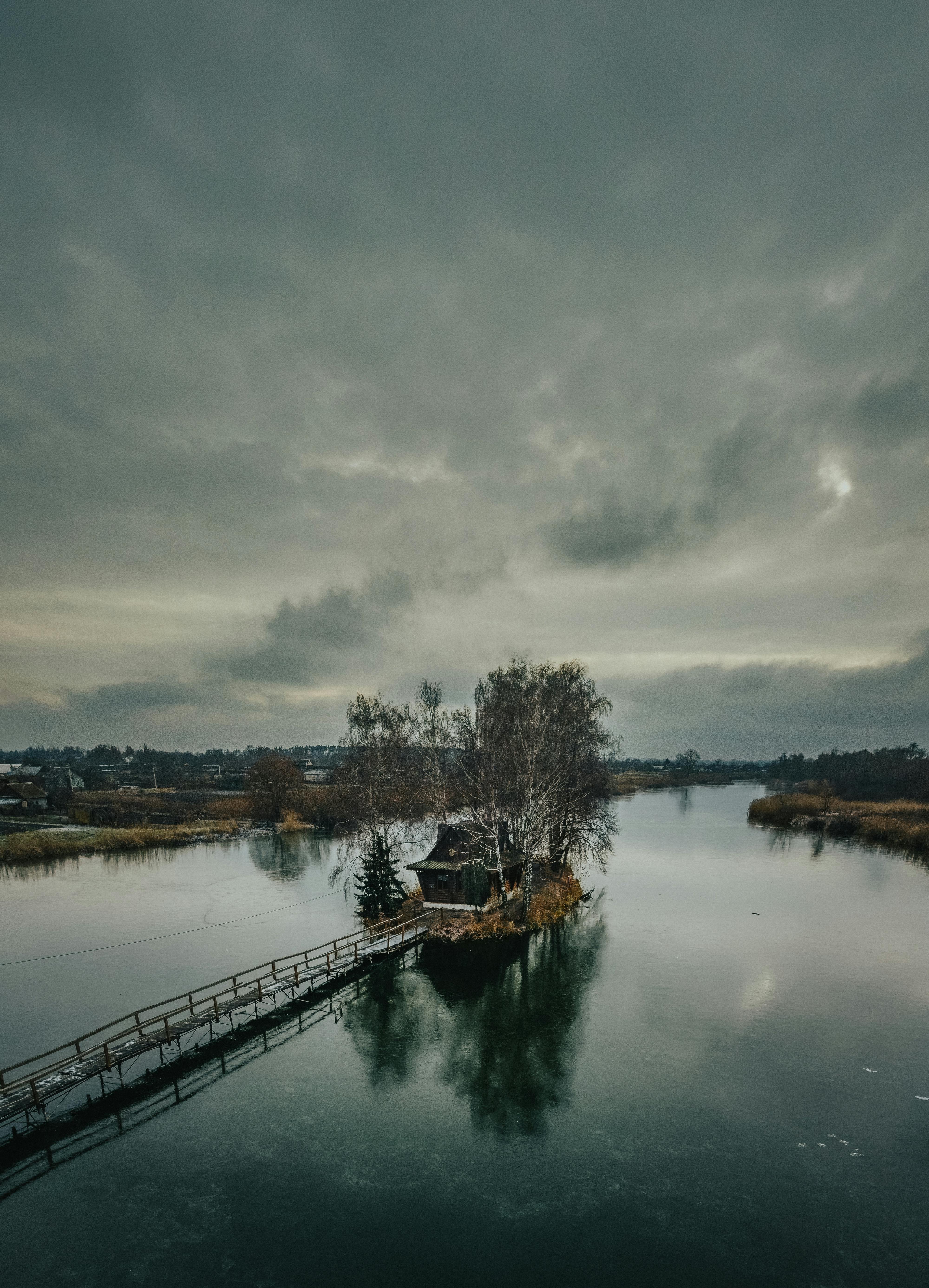 Hut on Islet in River · Free Stock Photo