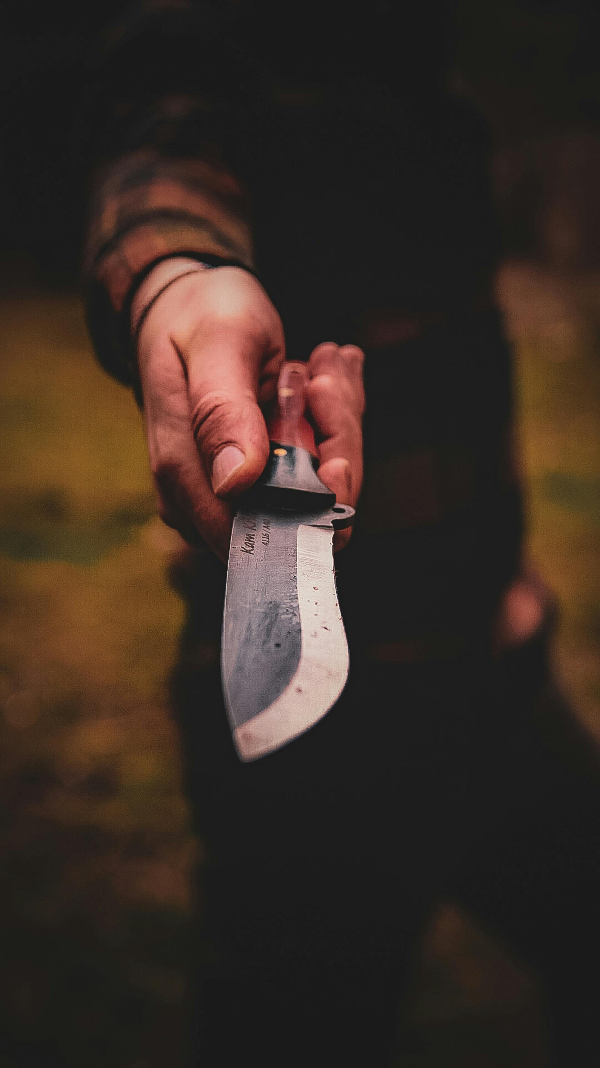 Man Hand Holding Knife · Free Stock Photo