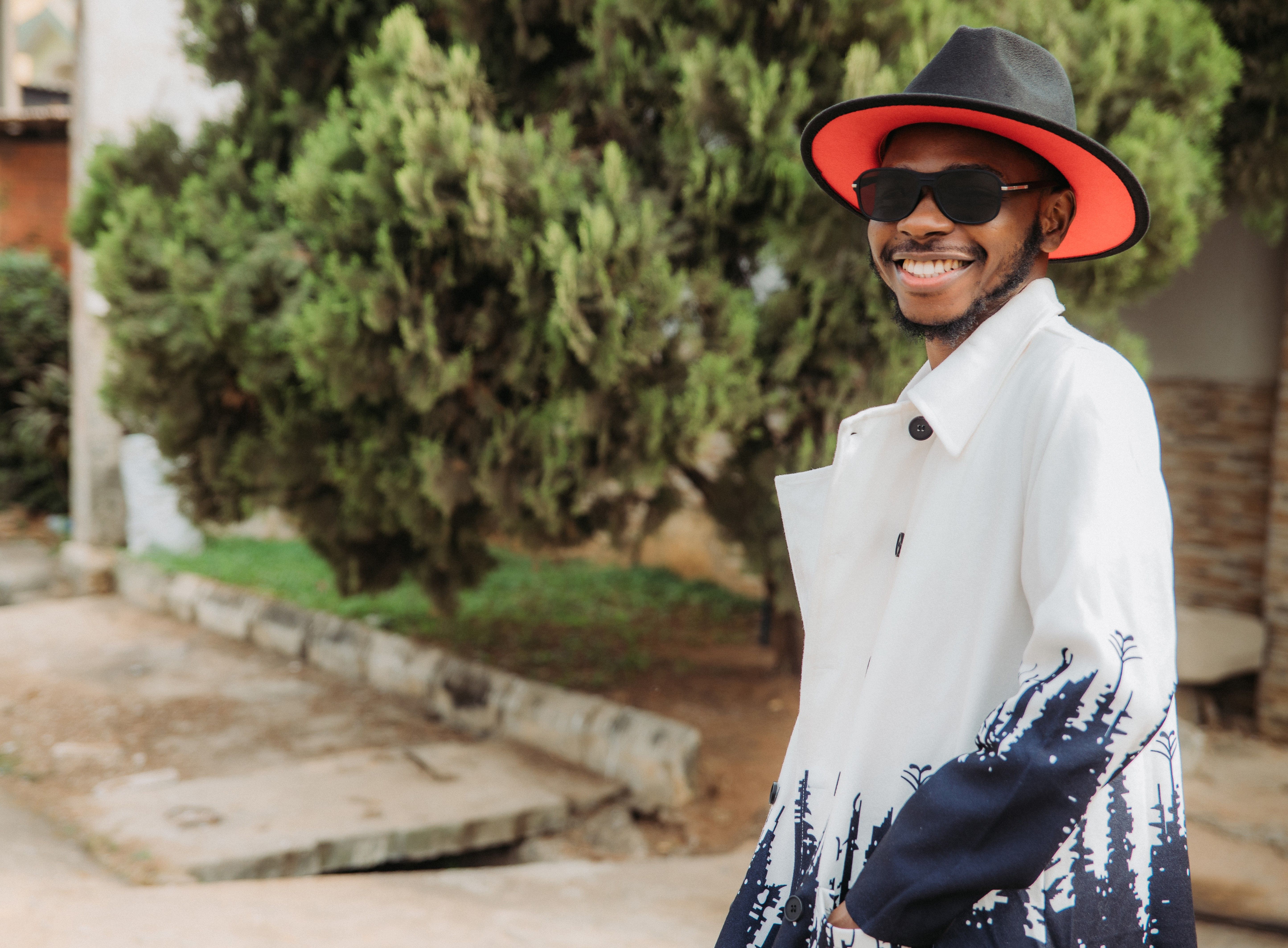 Smiling Man in Hat and Sunglasses · Free Stock Photo