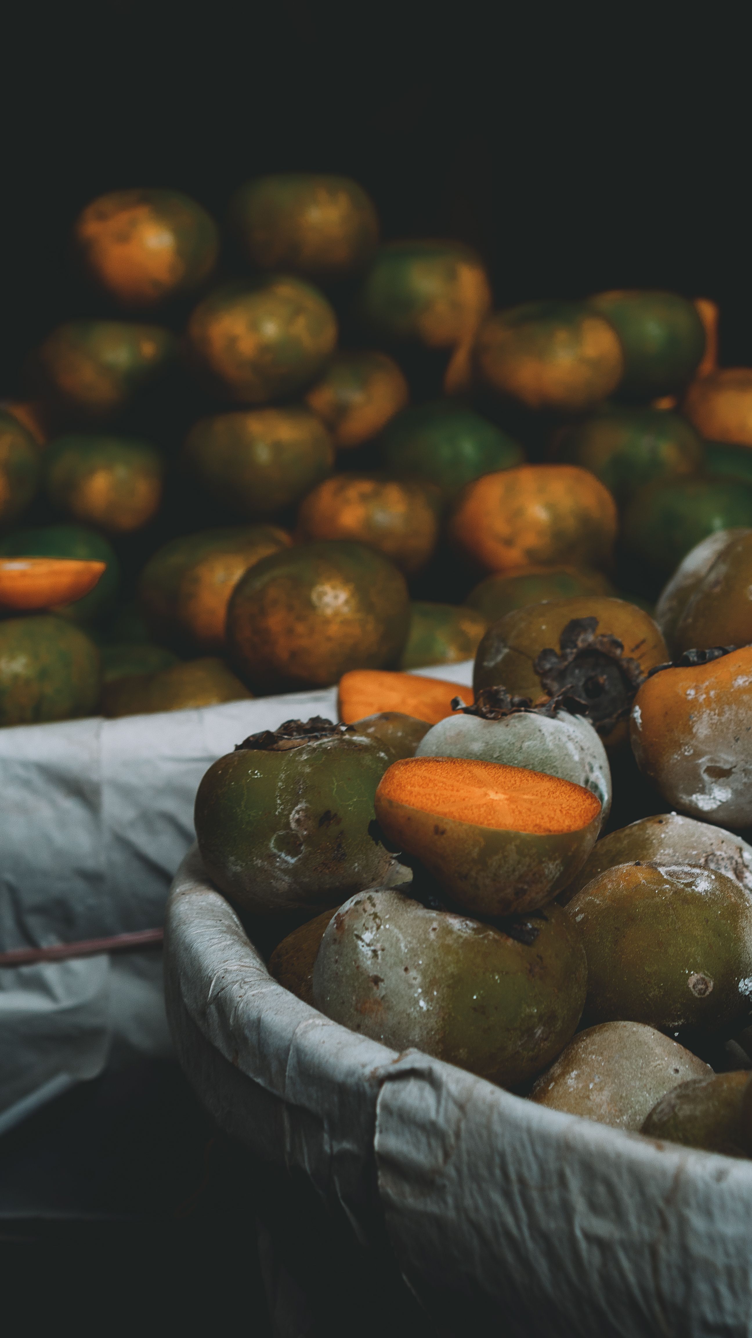Colorful Persimmons and Citrus Display in Aichi Market · Free Stock Photo