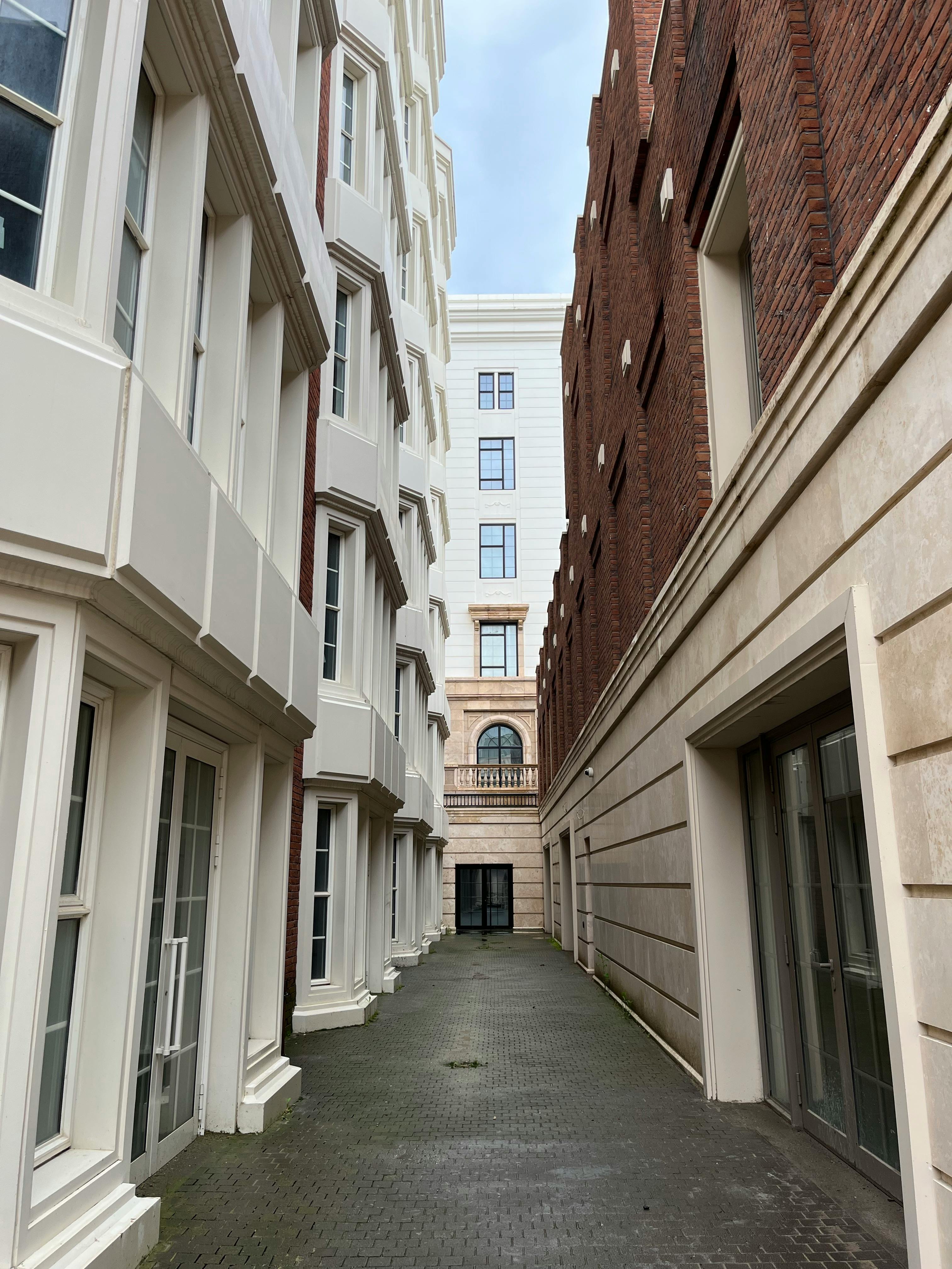 Photo of Alley Between Buildings · Free Stock Photo