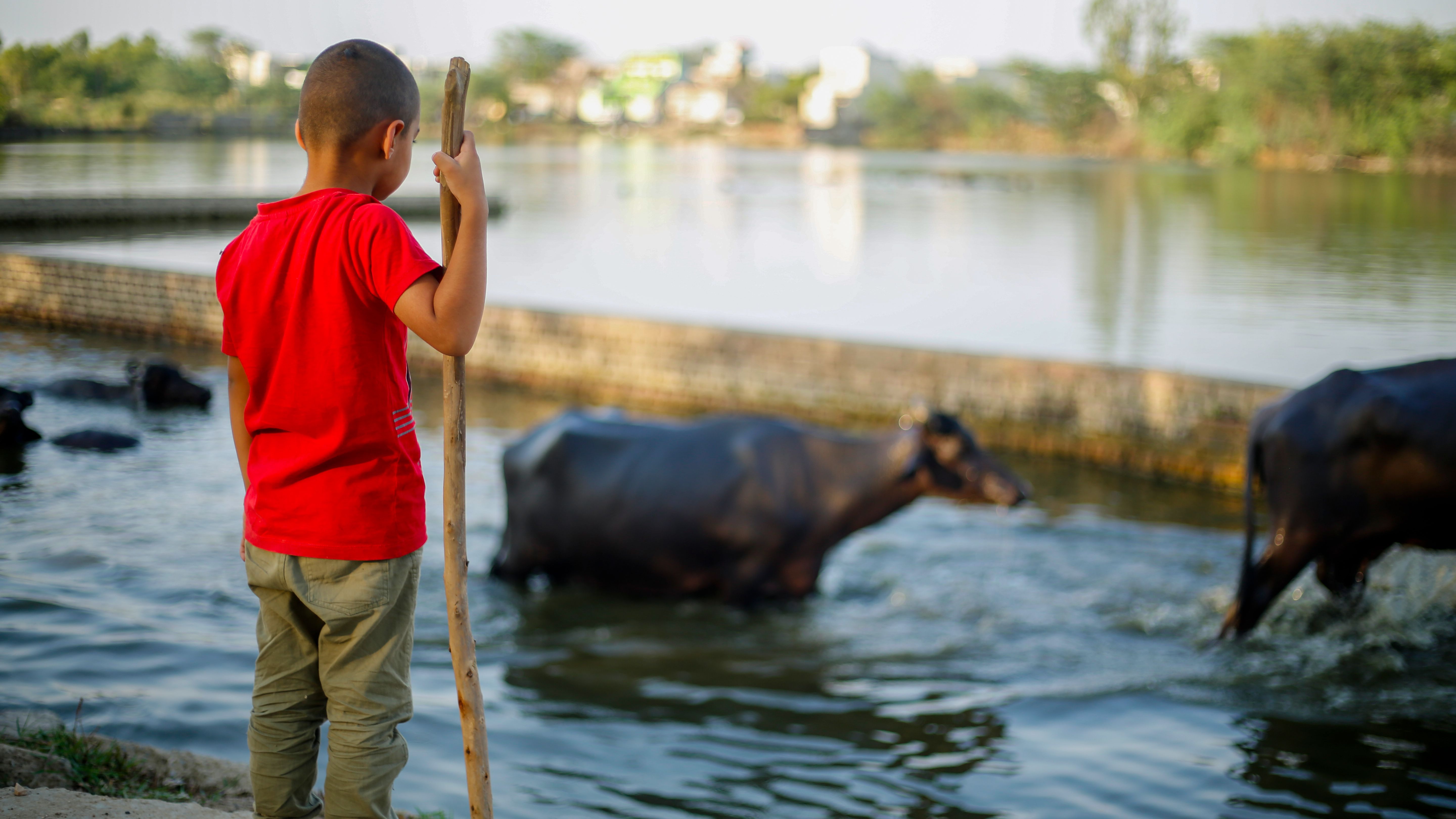 Parent with Child in Village · Free Stock Photo
