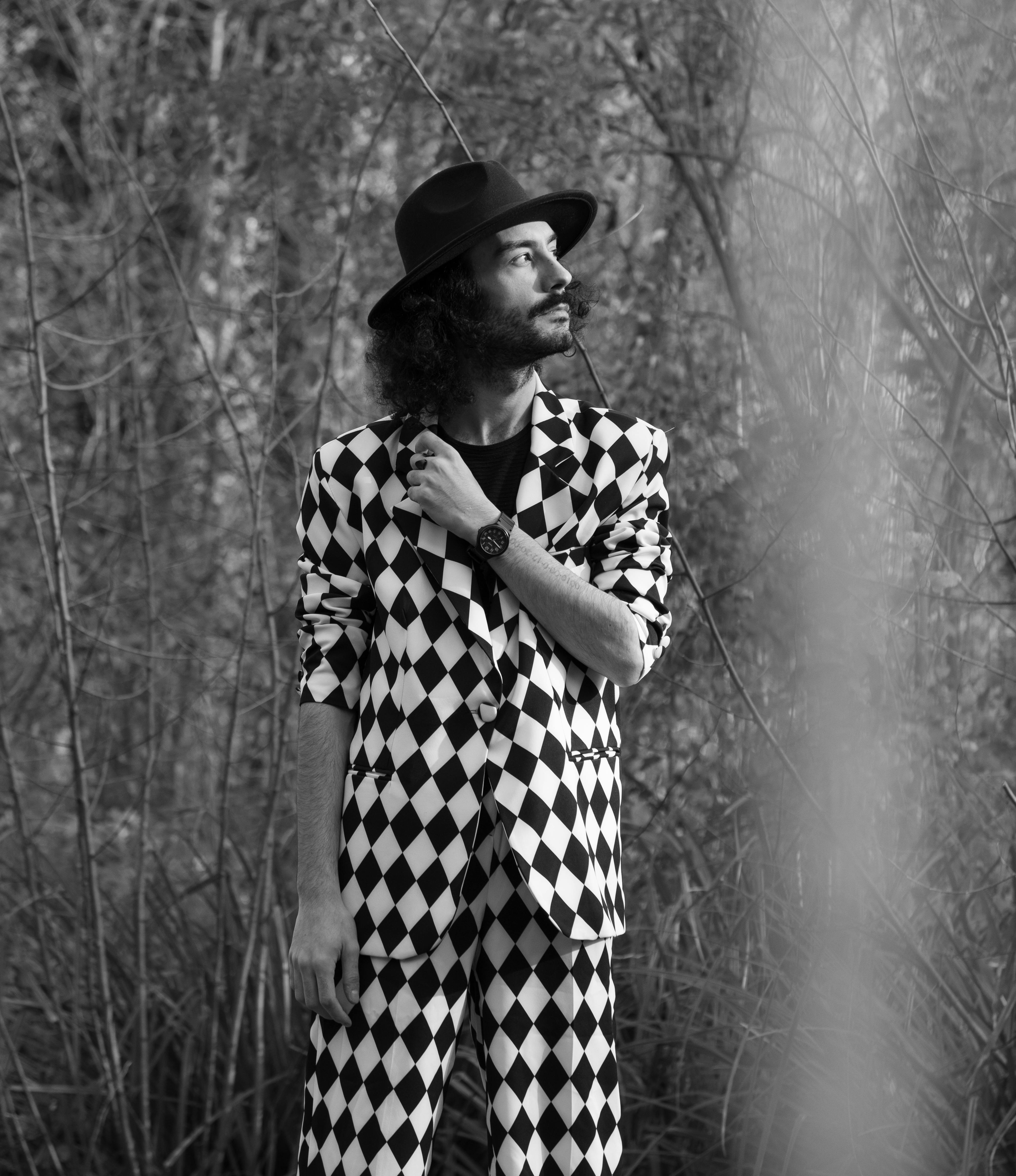 Man Wearing Abstract Suit in Black and White · Free Stock Photo