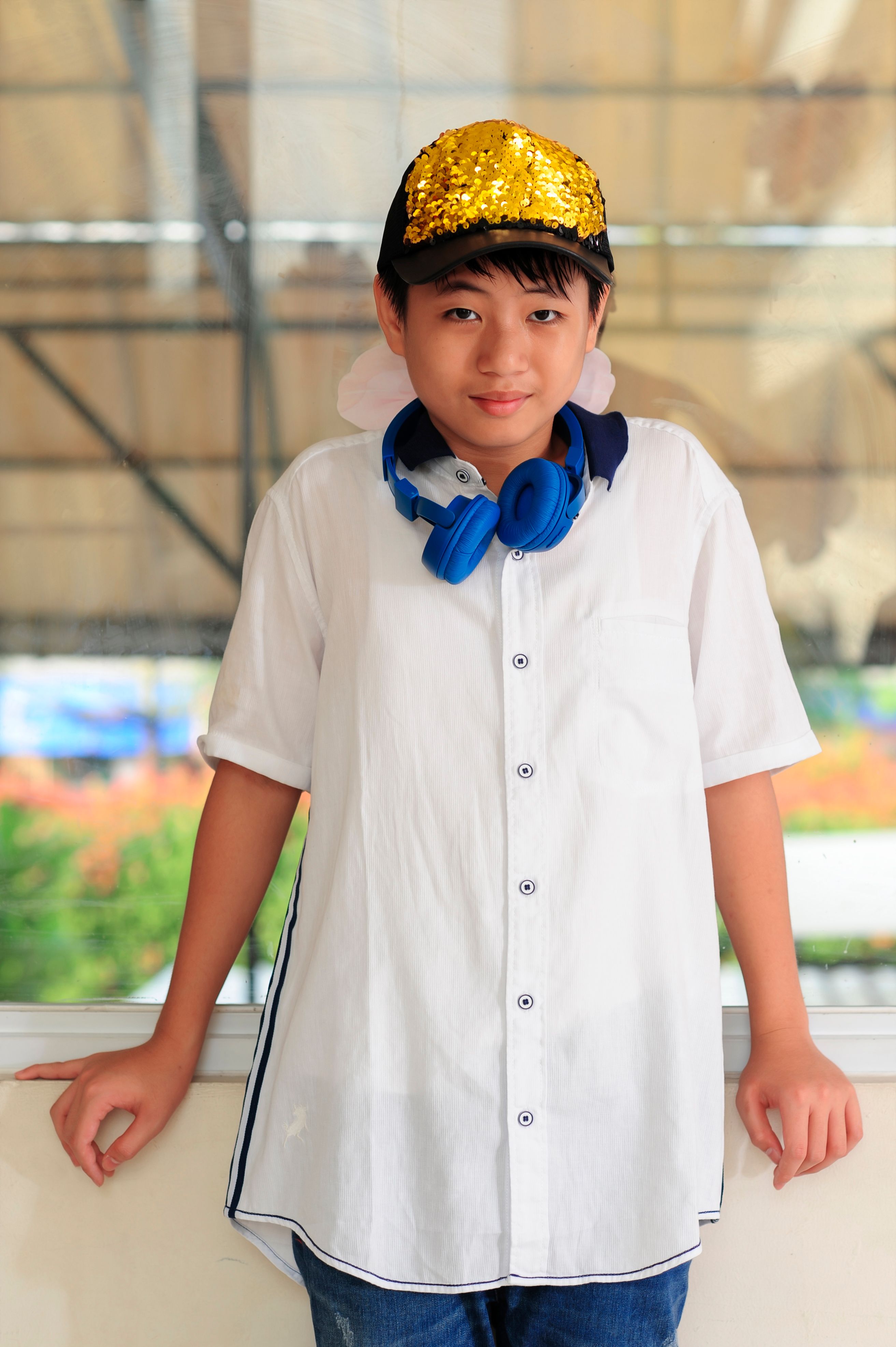 Portrait of a Boy Wearing a Taqiyah Cap · Free Stock Photo