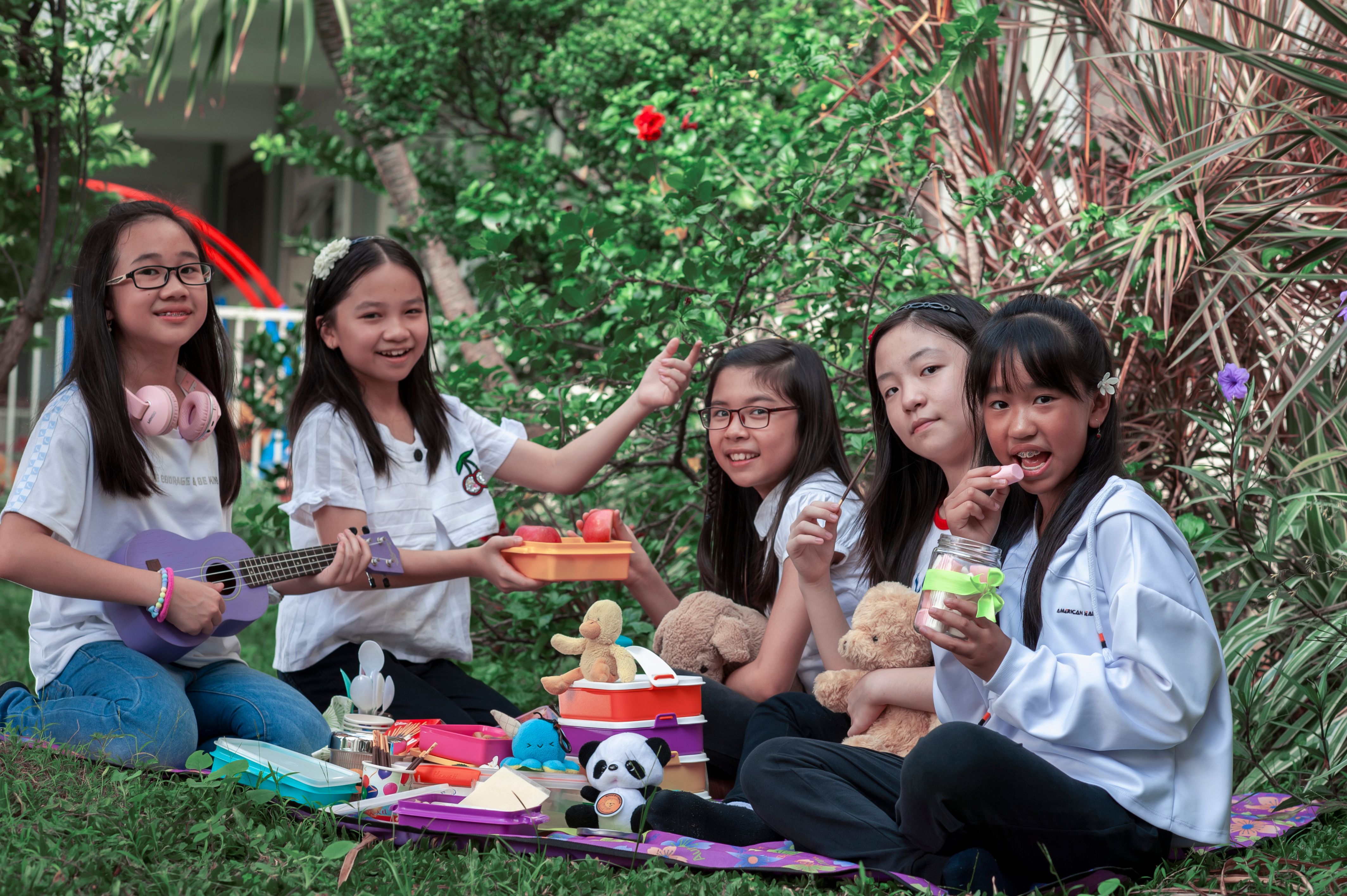 A Group of Children in a Garden · Free Stock Photo