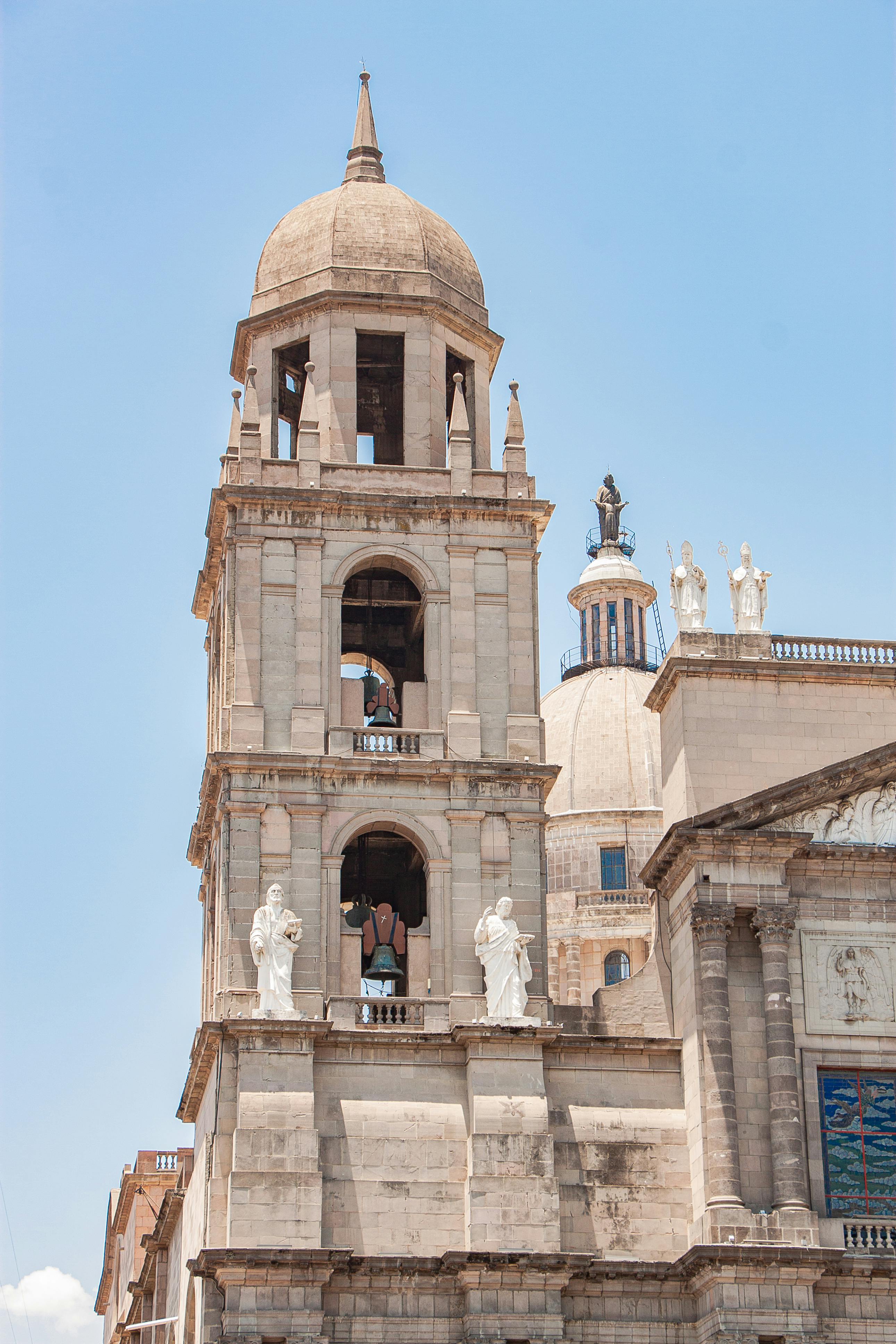 Closeup of a Baroque Beige Tower · Free Stock Photo