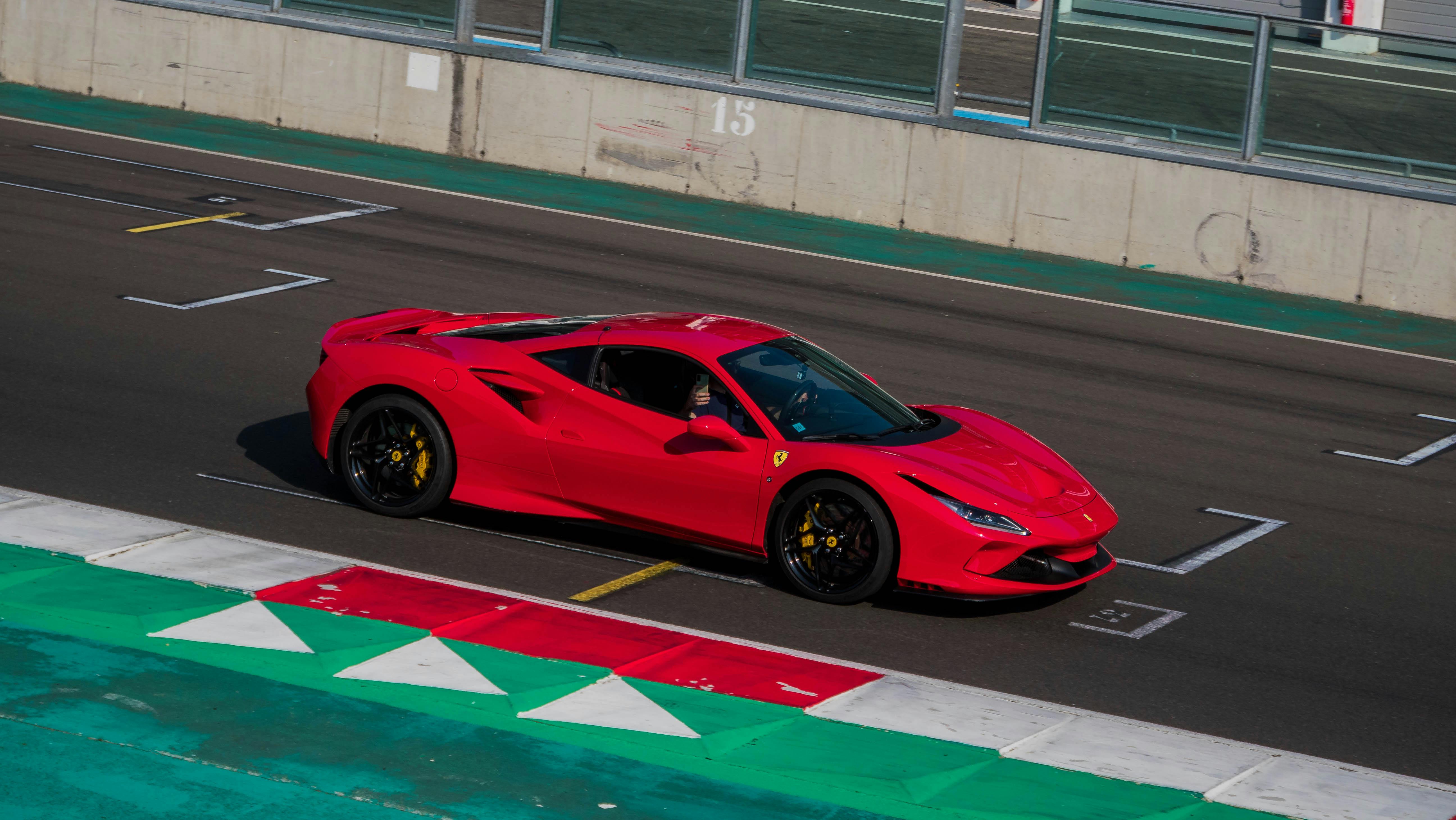 Ferrari F8 on Racing Circuit · Free Stock Photo