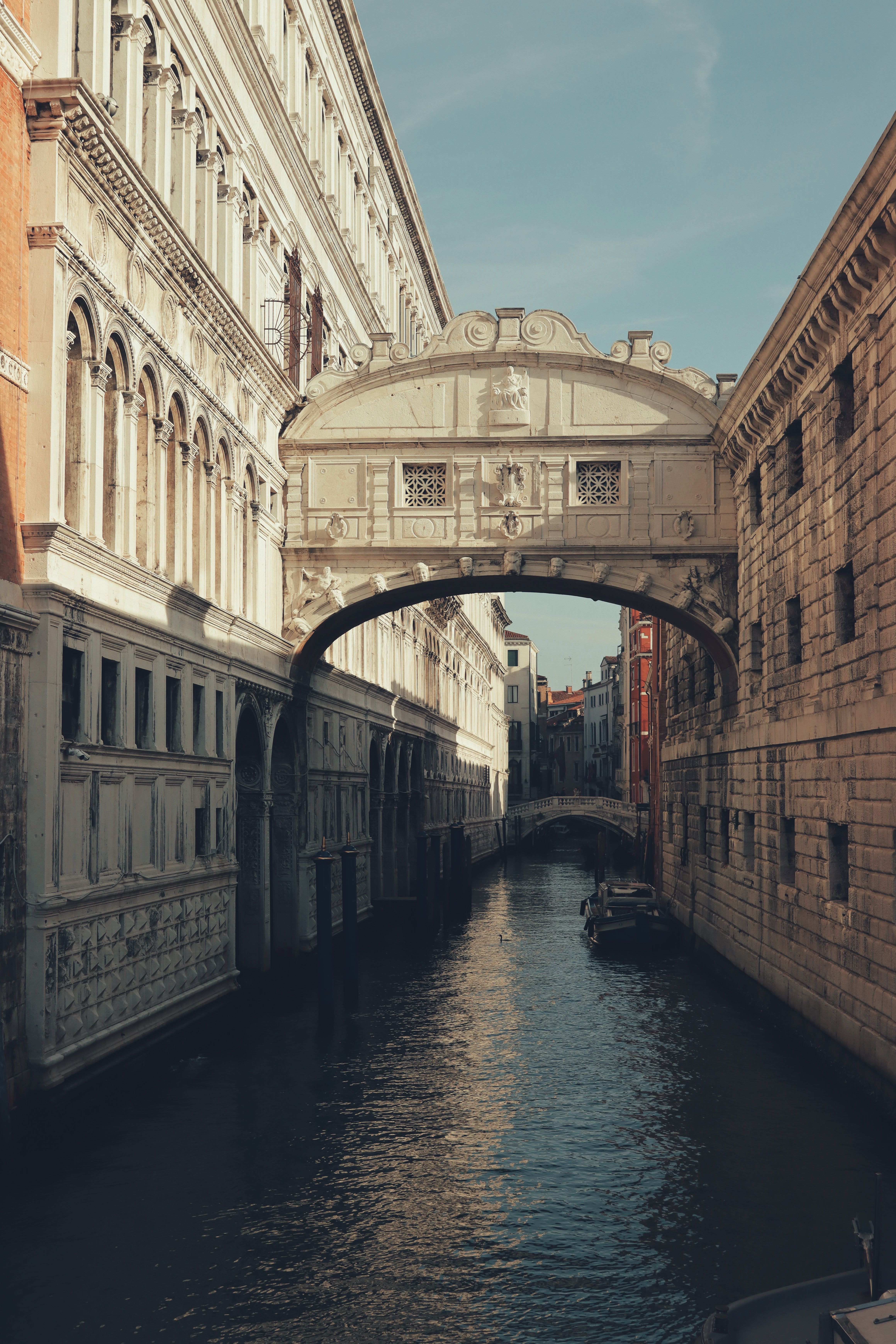 View of an Arch over the Canal and between Buildings in Venice, Italy ...