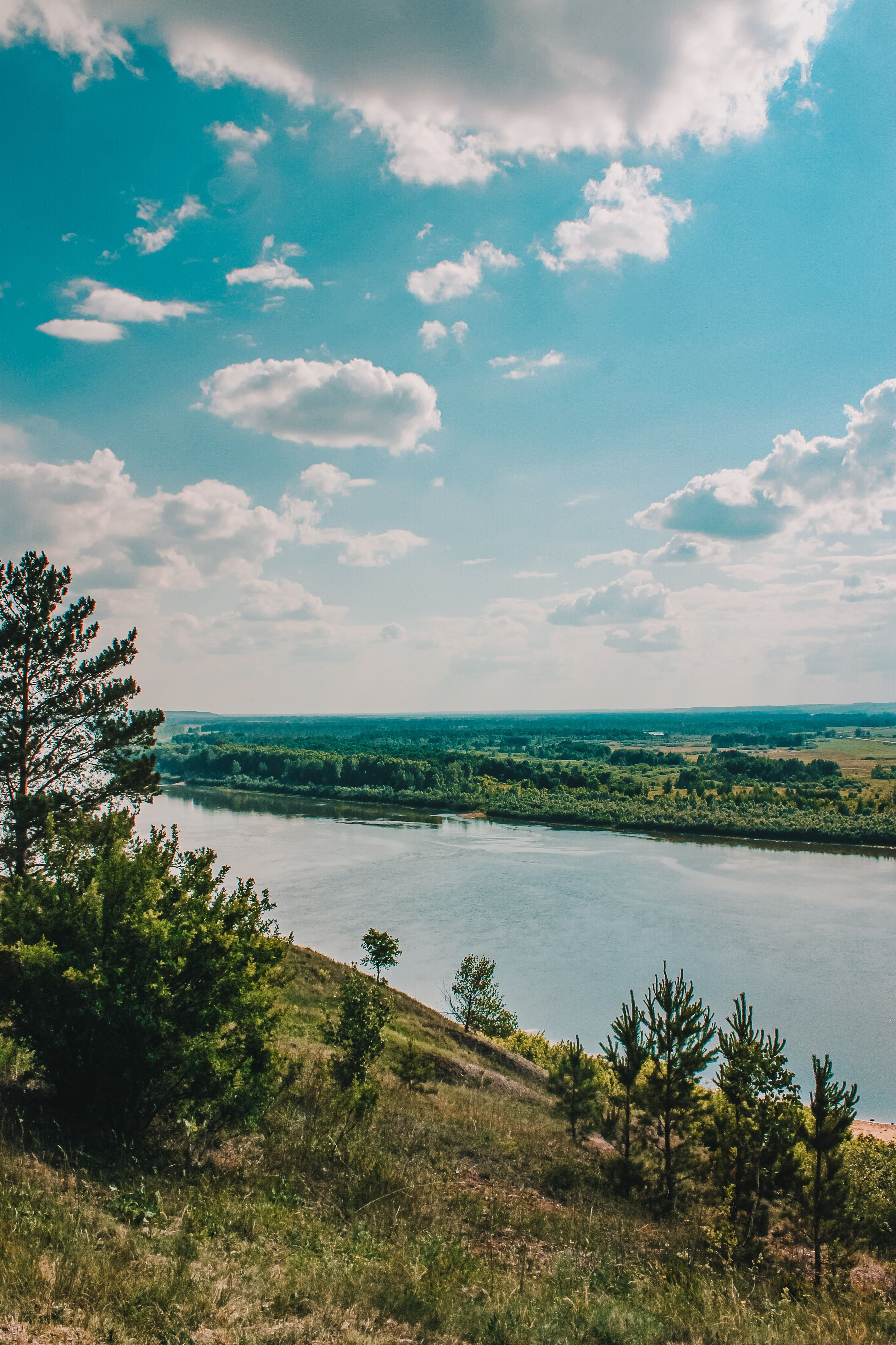 Hill over River with Plains behind · Free Stock Photo
