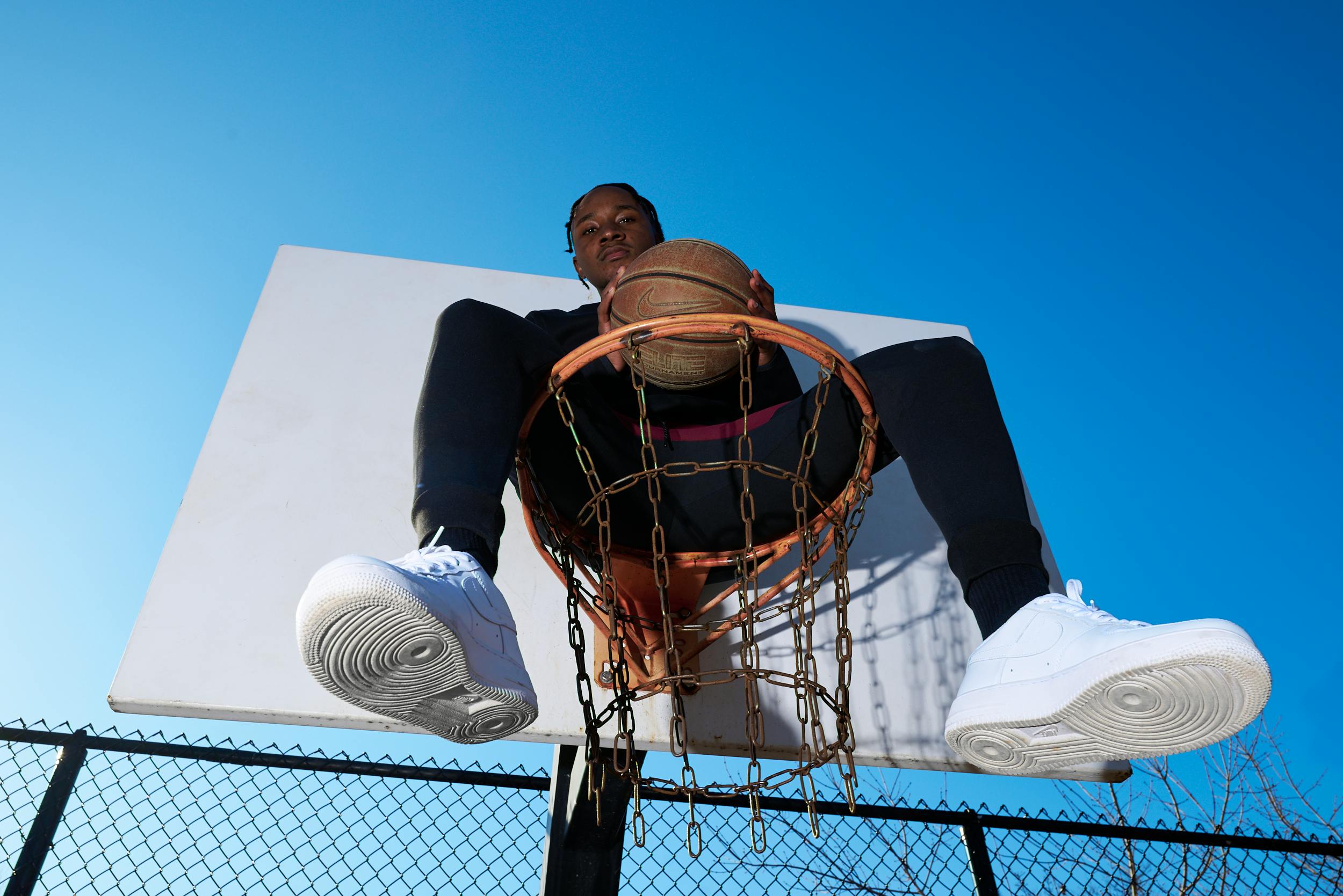 Man Wearing Gray Crew Neck Shirt Holding Basketball · Free Stock Photo