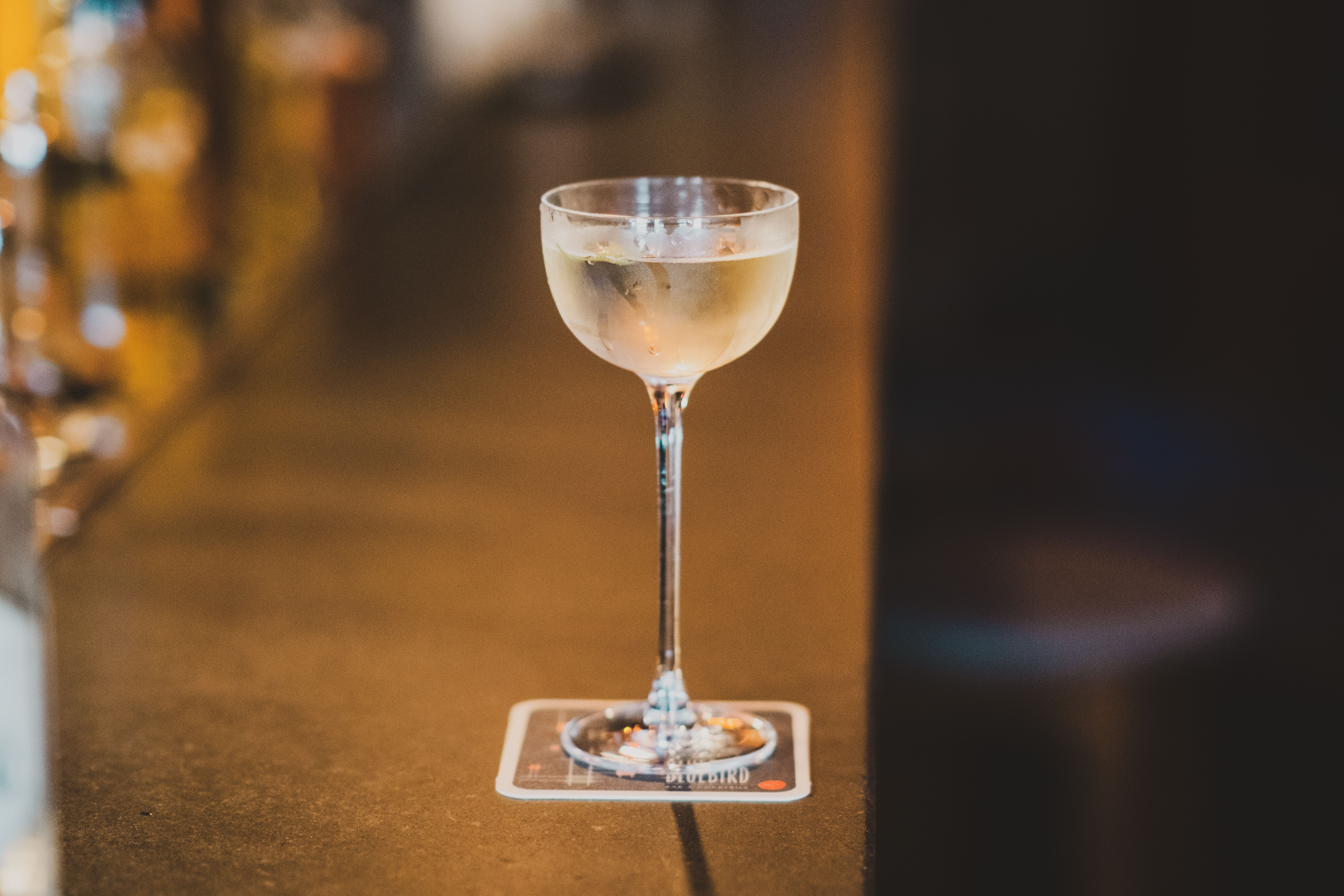 Glass of a Cold Drink on a Bar Counter · Free Stock Photo