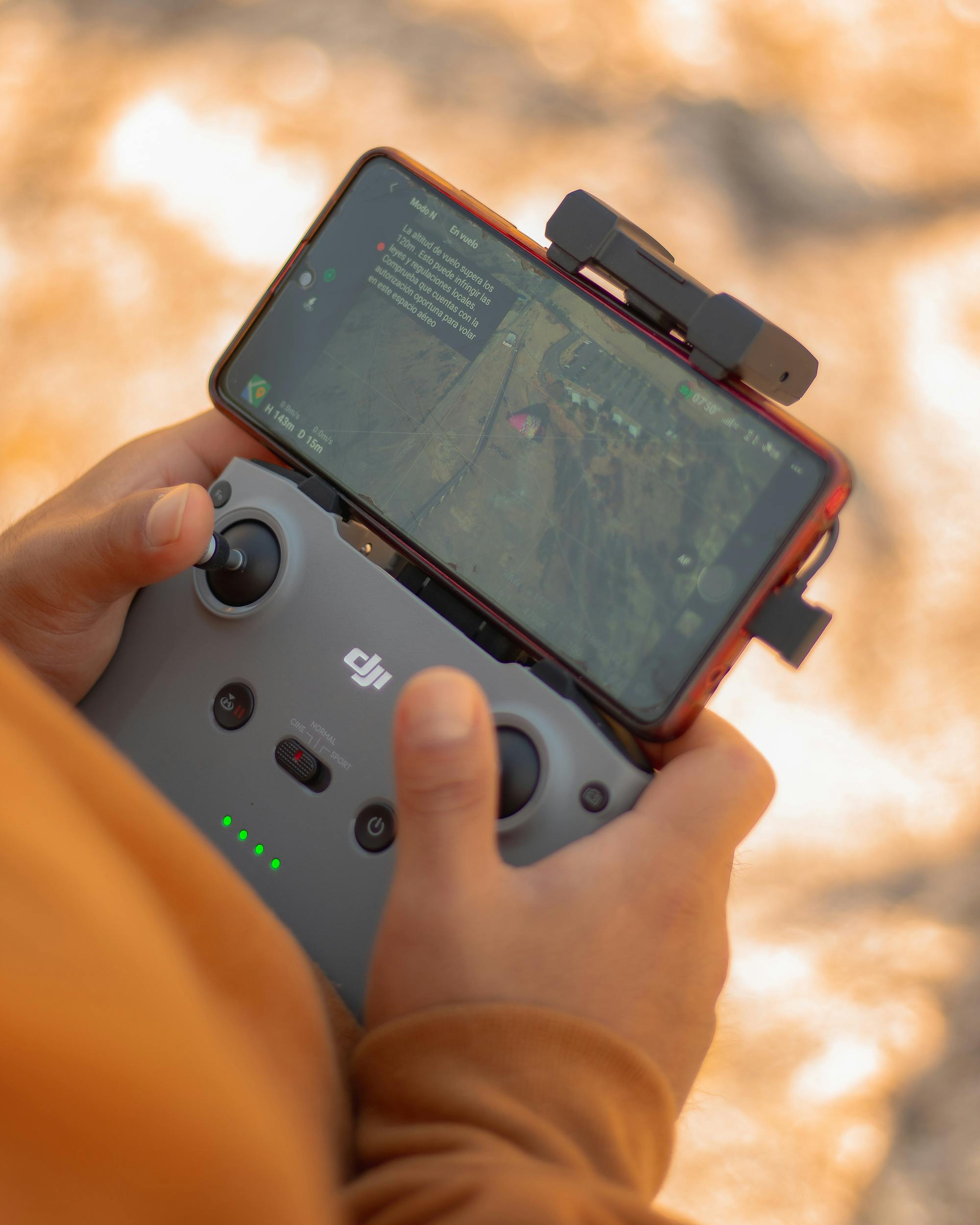 A Man Wearing Goggles and Controlling a Drone · Free Stock Photo