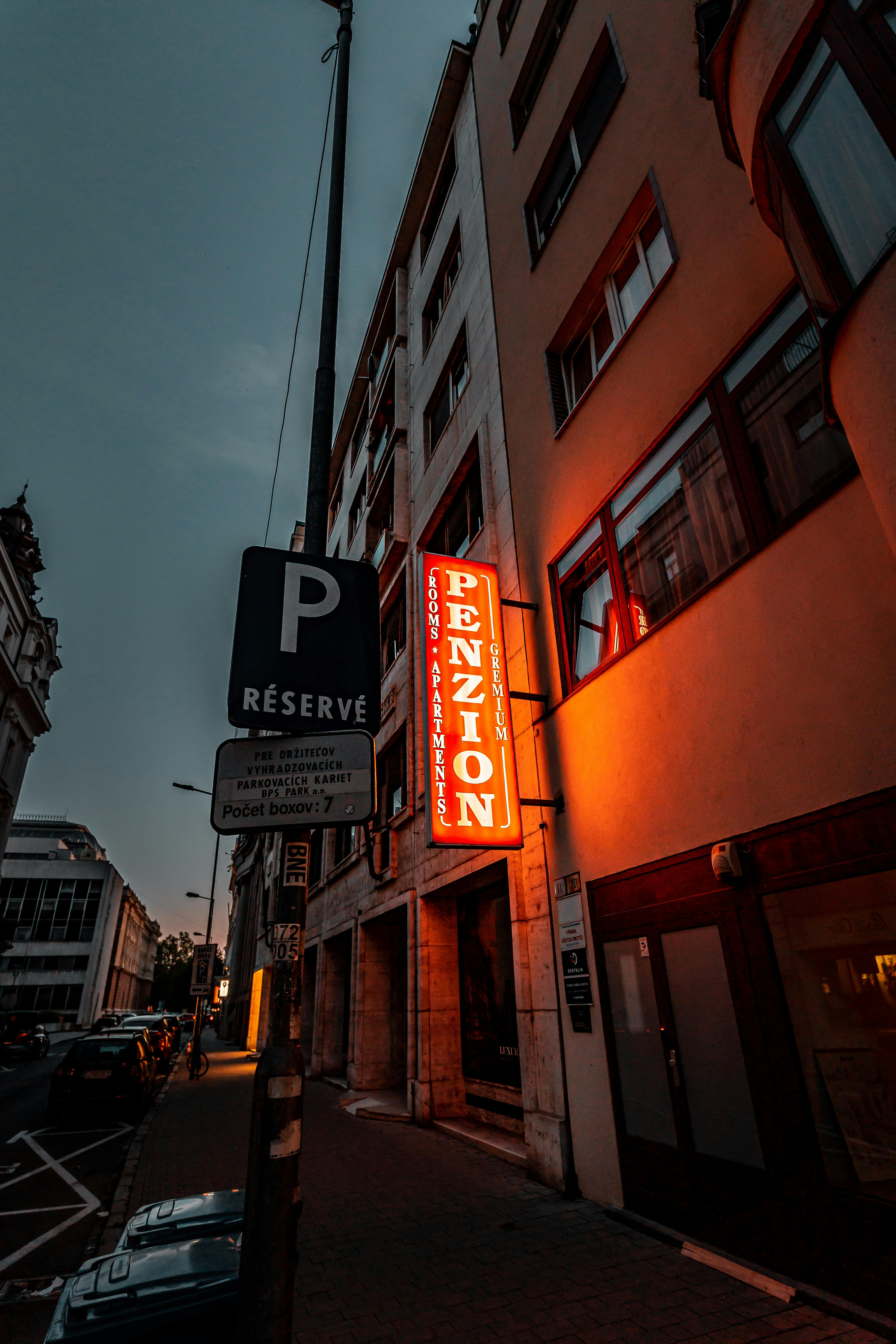 Brown Hotel Signage · Free Stock Photo