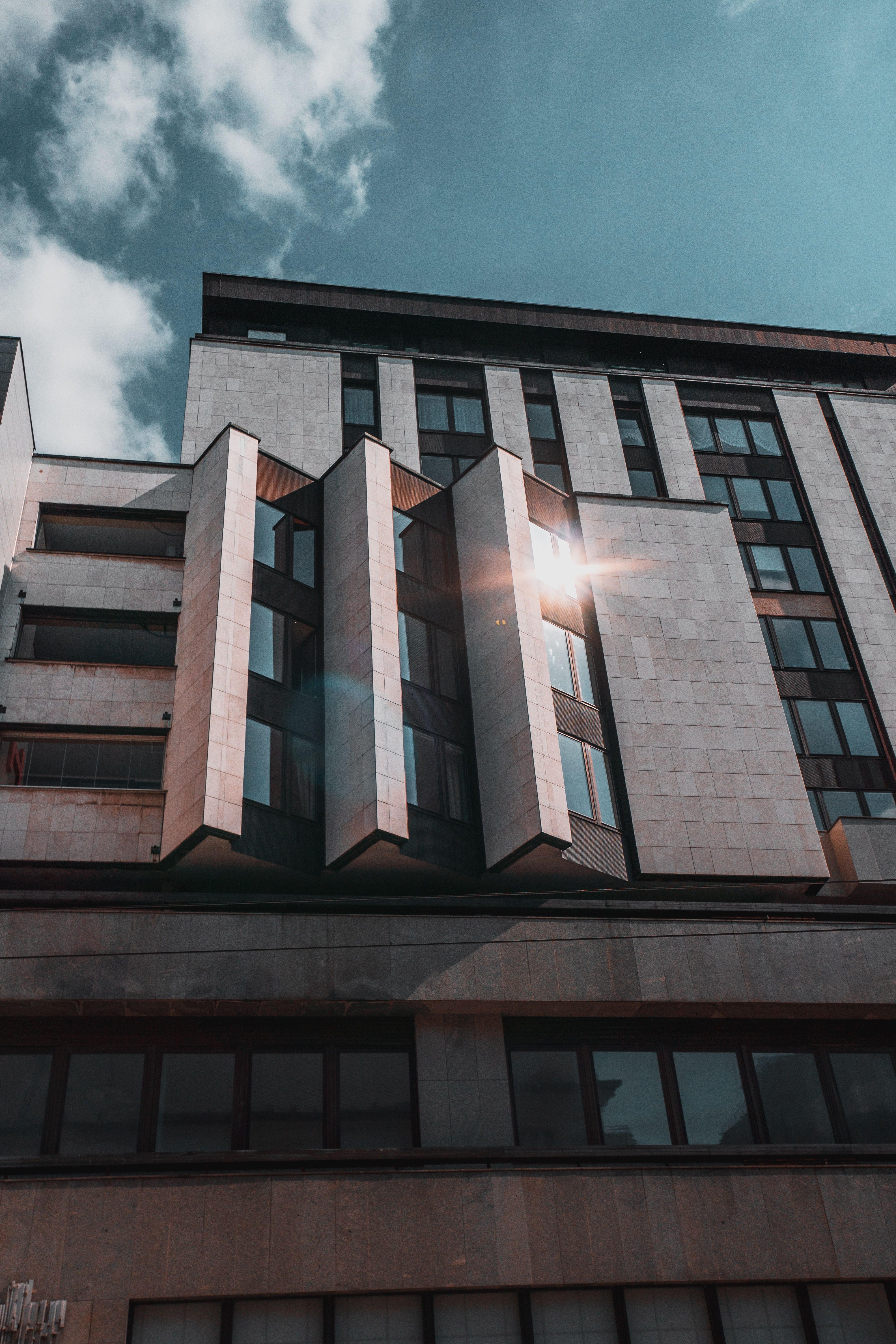 Sunlight Shining on Windows of Office Building · Free Stock Photo