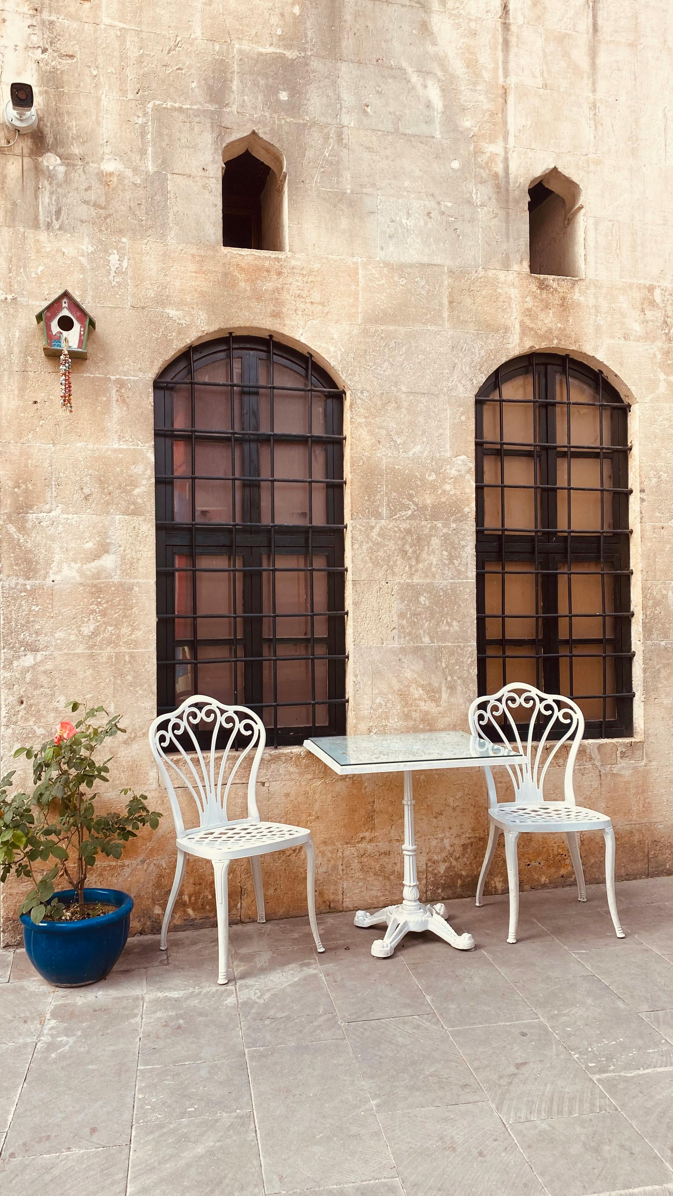 Black Metal Table and Chairs · Free Stock Photo