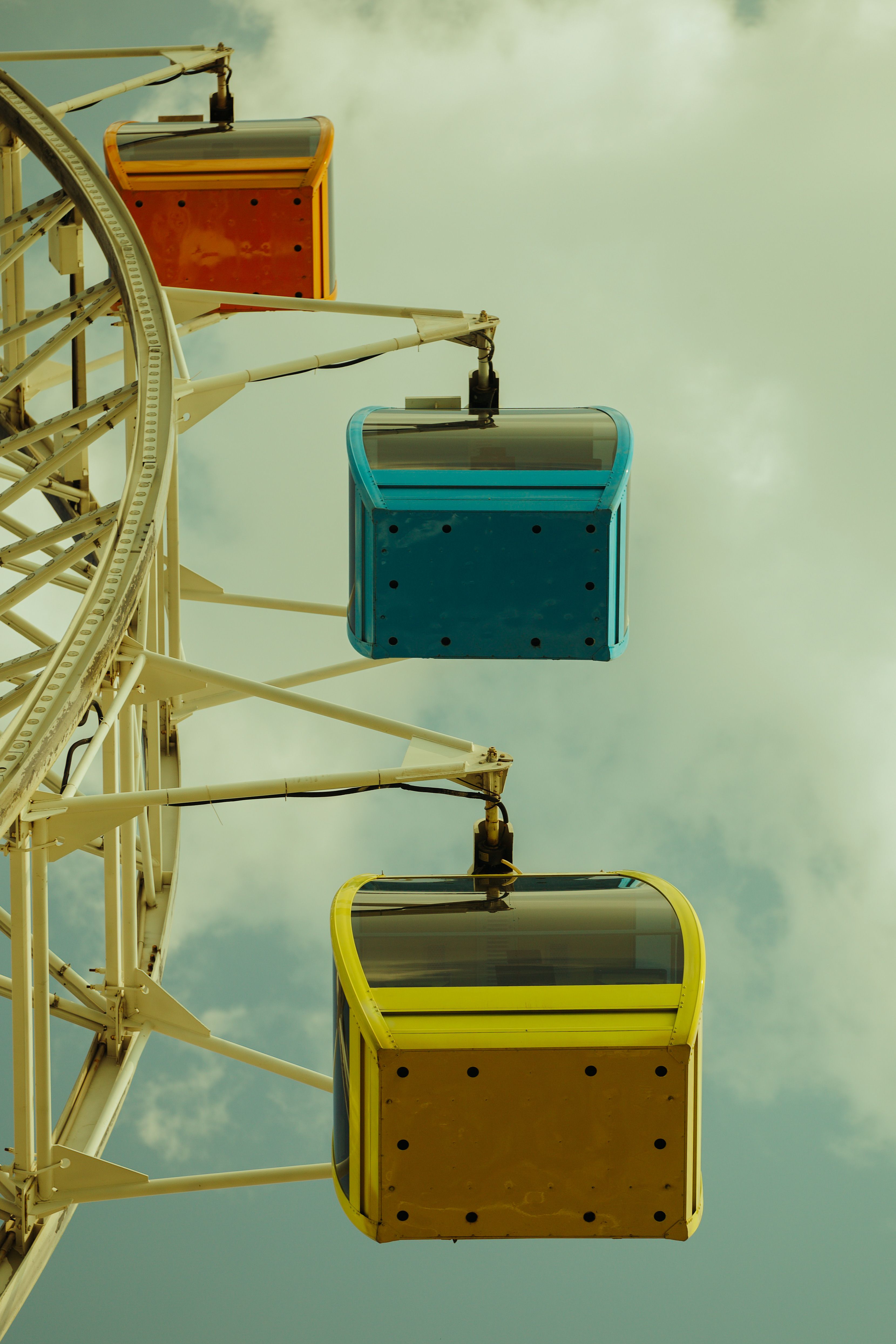 Low Angle Shot of Cabins on a Ferris Wheel · Free Stock Photo