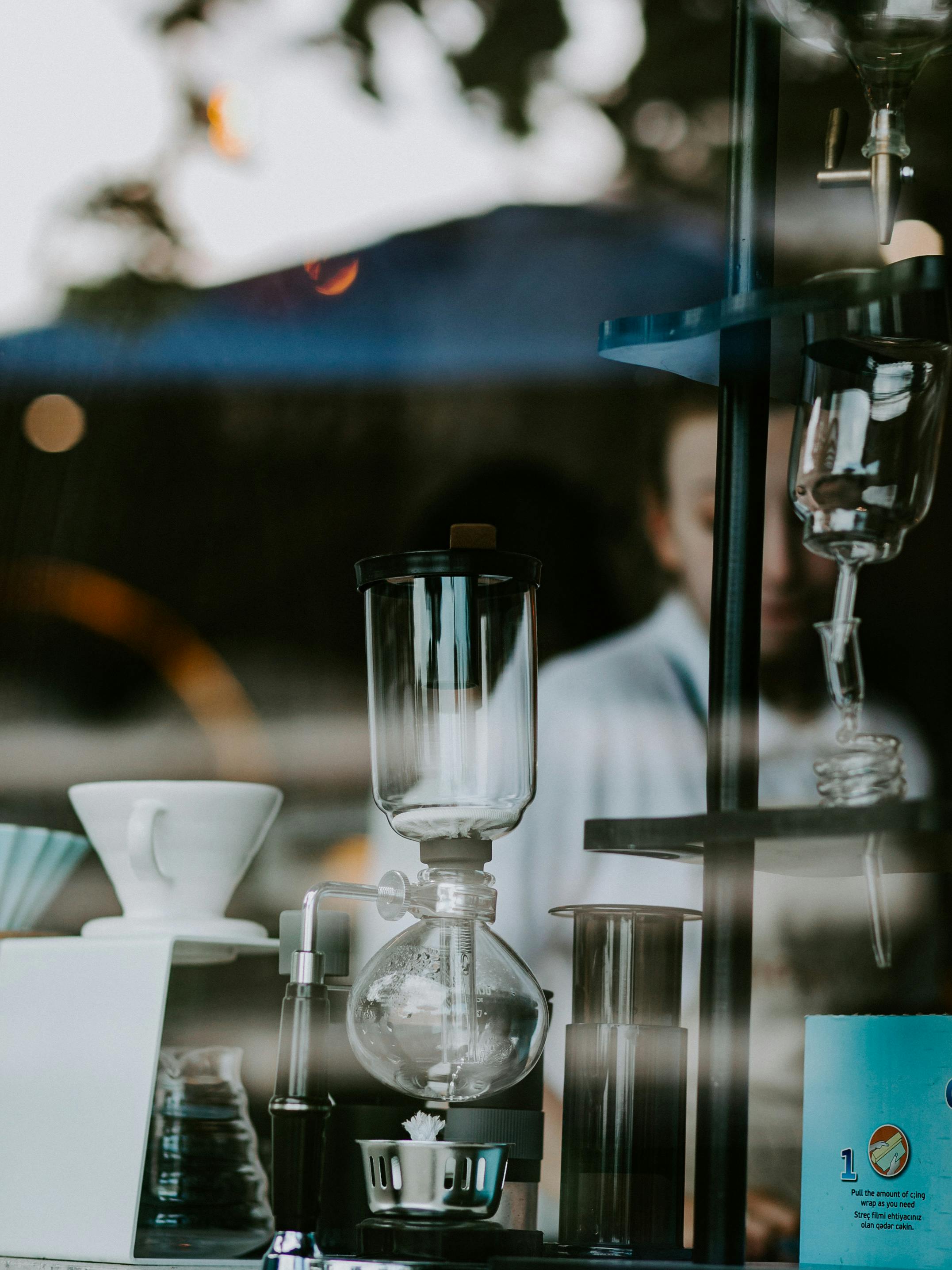 A Coffee Syphon on a Coffee Making Station · Free Stock Photo