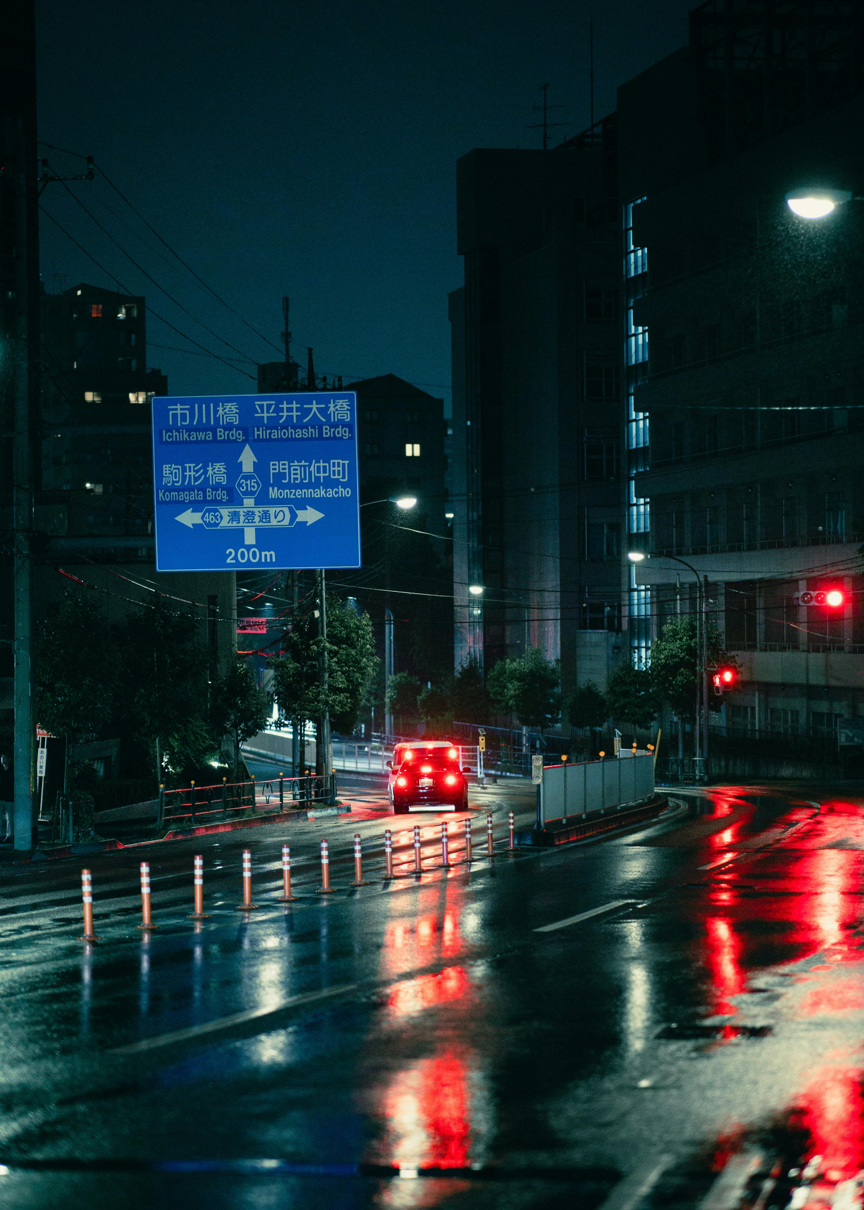 Parking Area With Reflection Of Red Light · Free Stock Photo