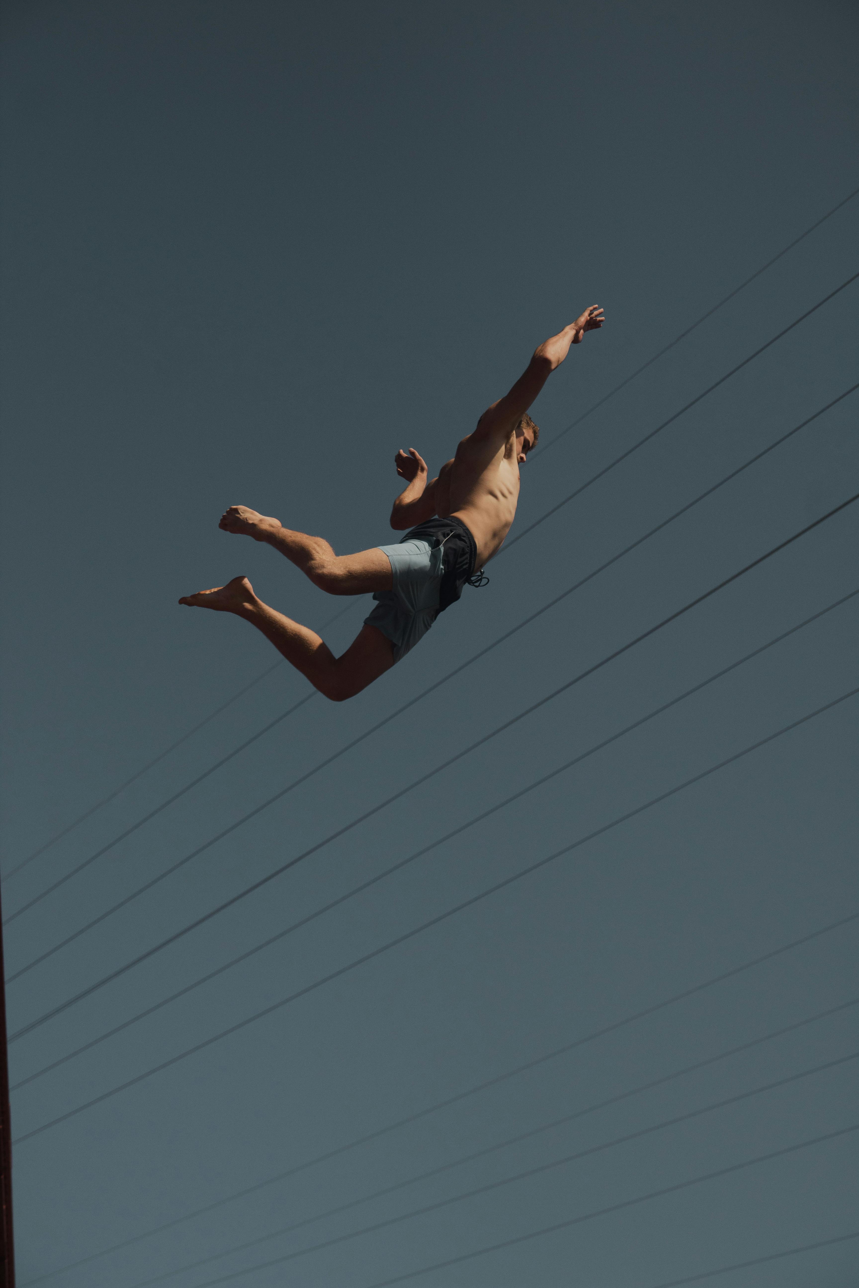 Man On Cliff About To Jump · Free Stock Photo
