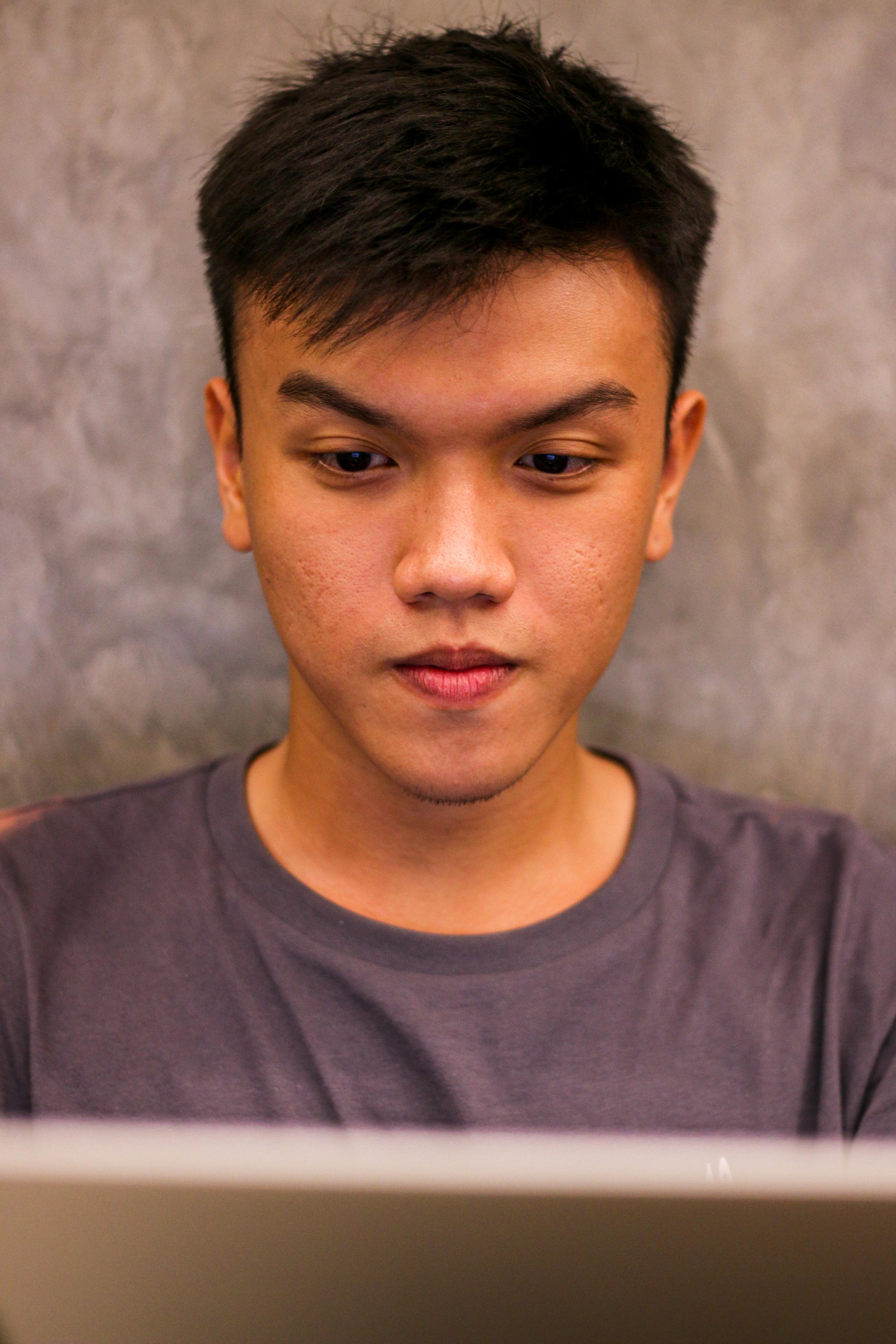 Girl with Short Hair Sitting and Smiling · Free Stock Photo