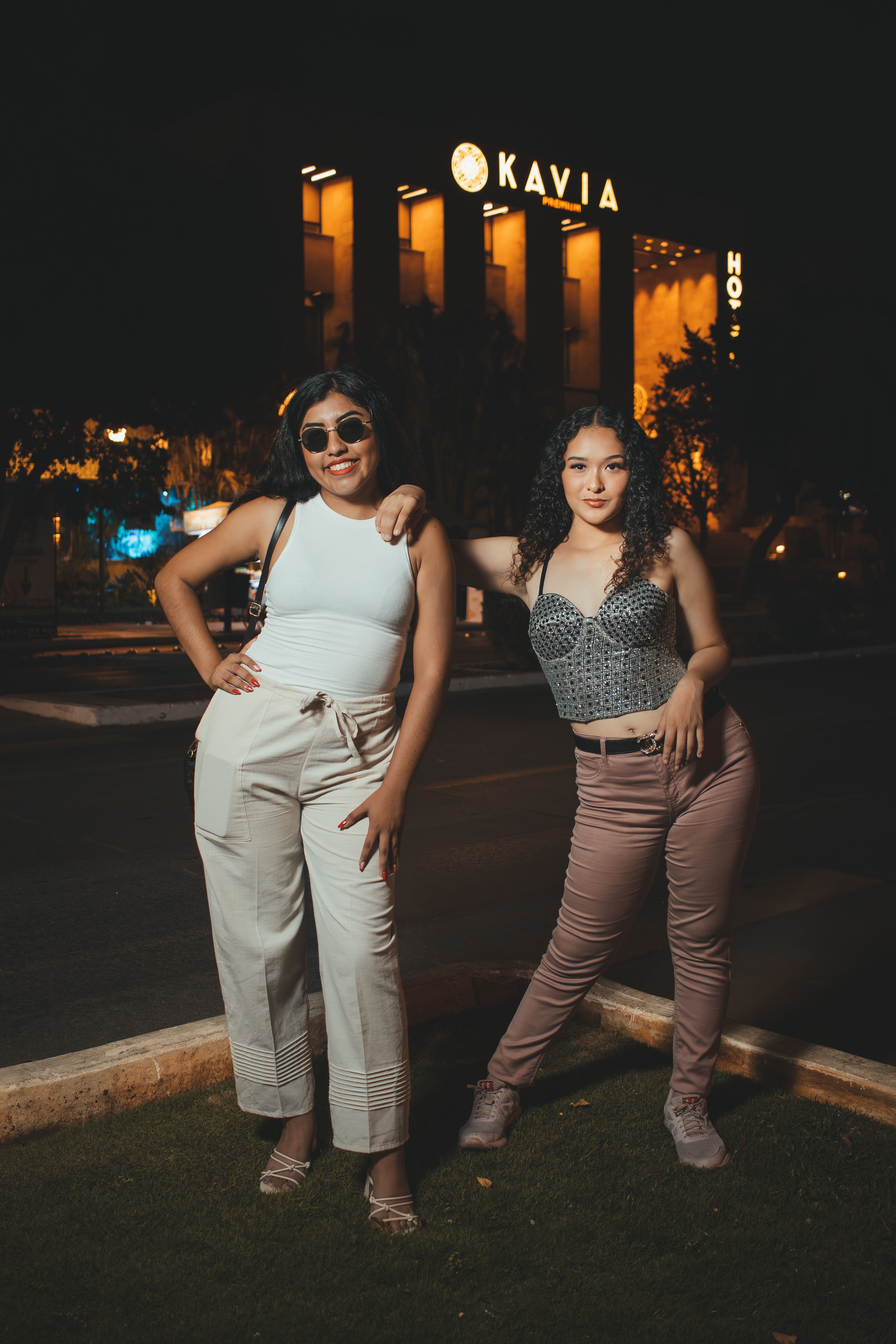Two Women Standing Together at Night · Free Stock Photo