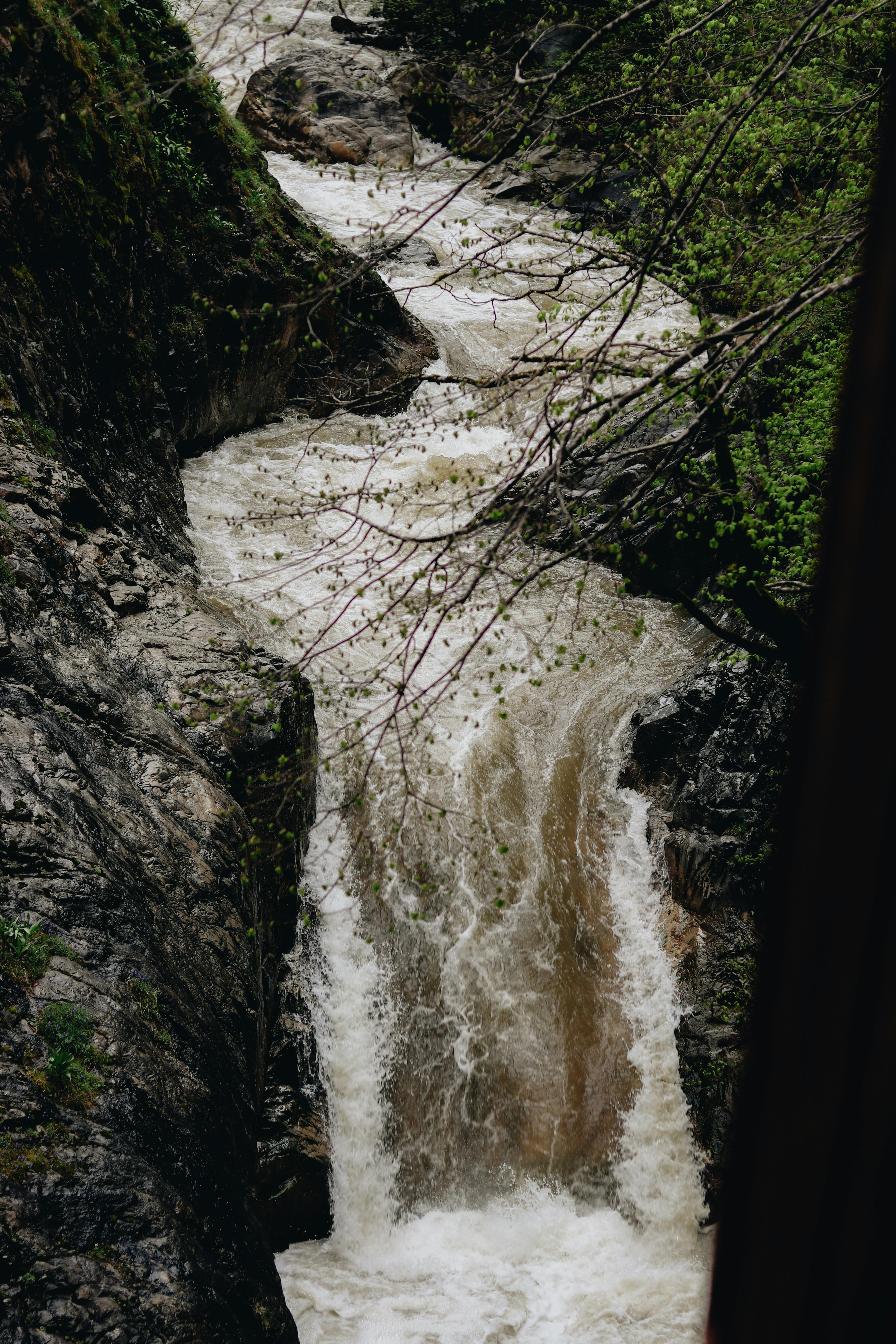 Bridge In Front of a Waterfall · Free Stock Photo