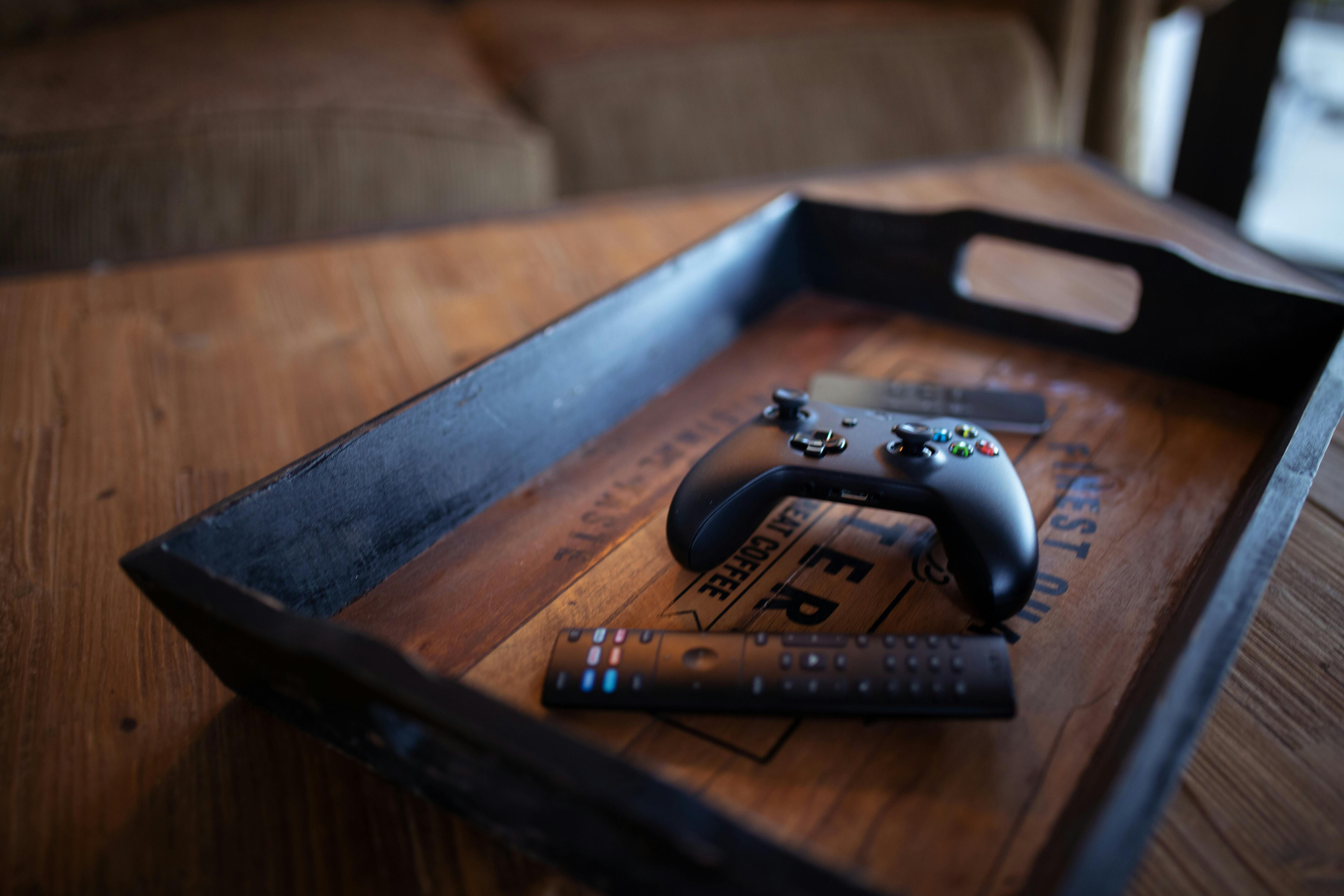 Black Controller On Tray · Free Stock Photo